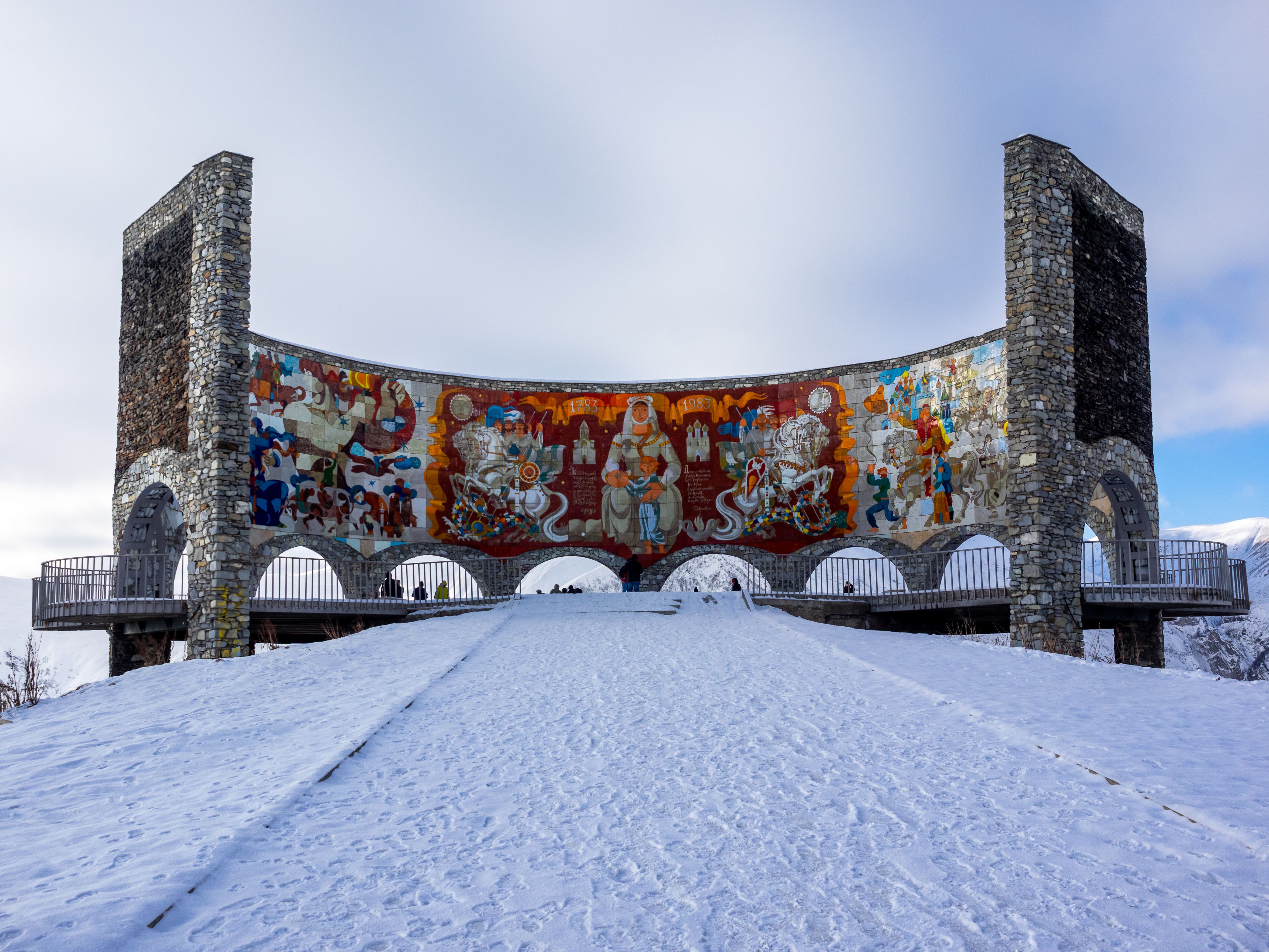 Old stone monument whit large tile work on snowy hill in winter · Free ...