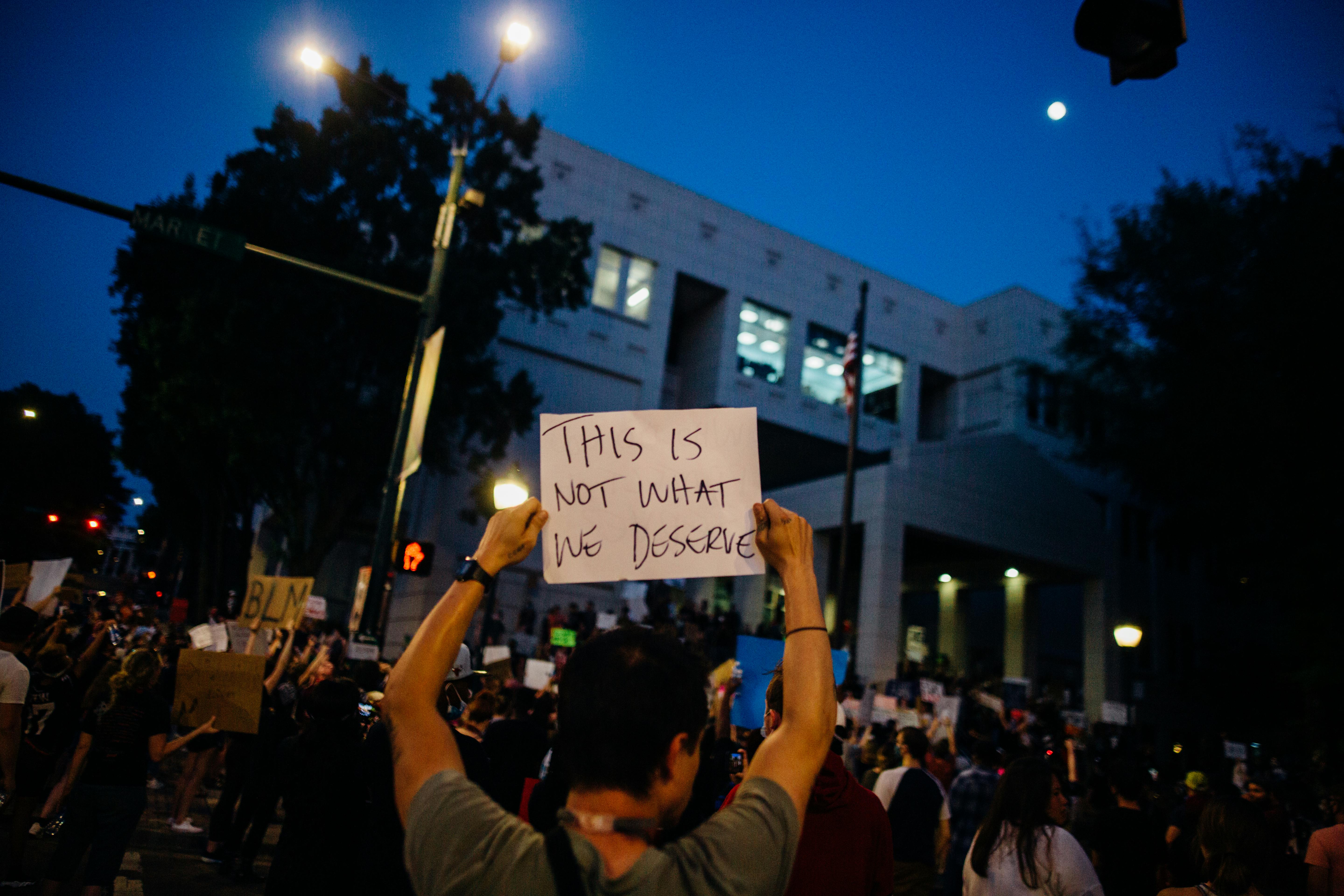 Protesters Holding Signs · Free Stock Photo