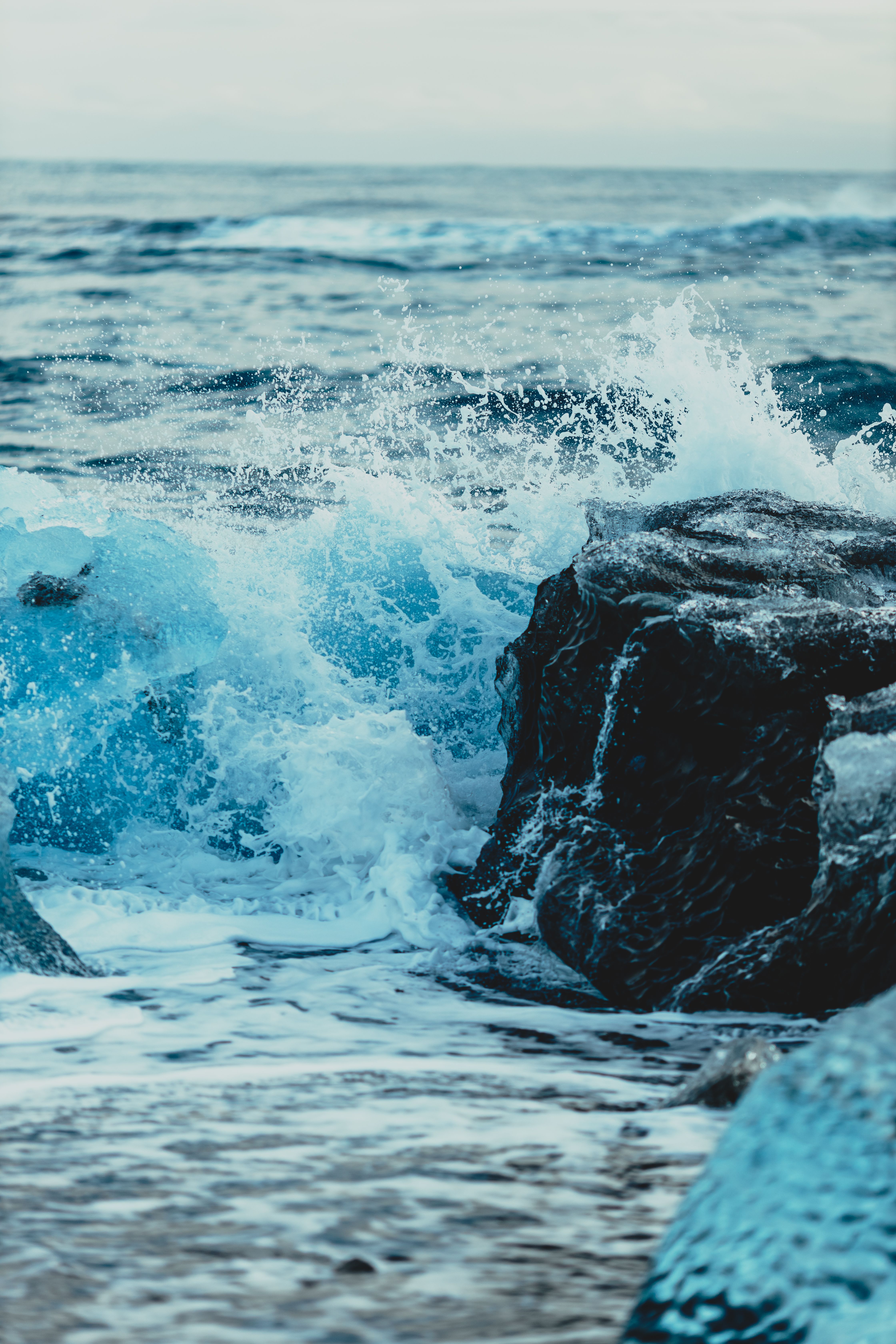 Stormy cold ocean waves and rocks · Free Stock Photo