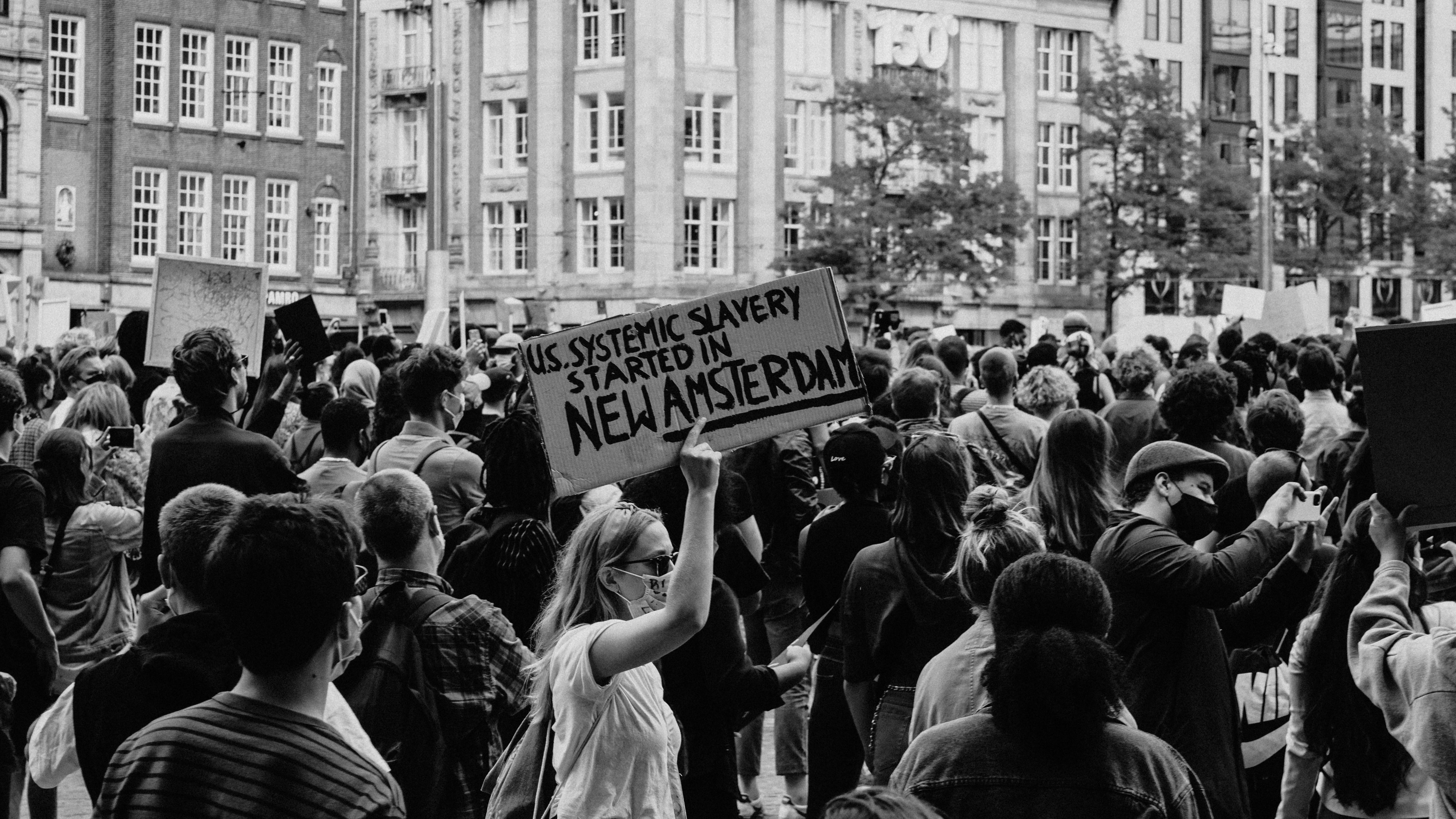 Protester Holding Sign · Free Stock Photo