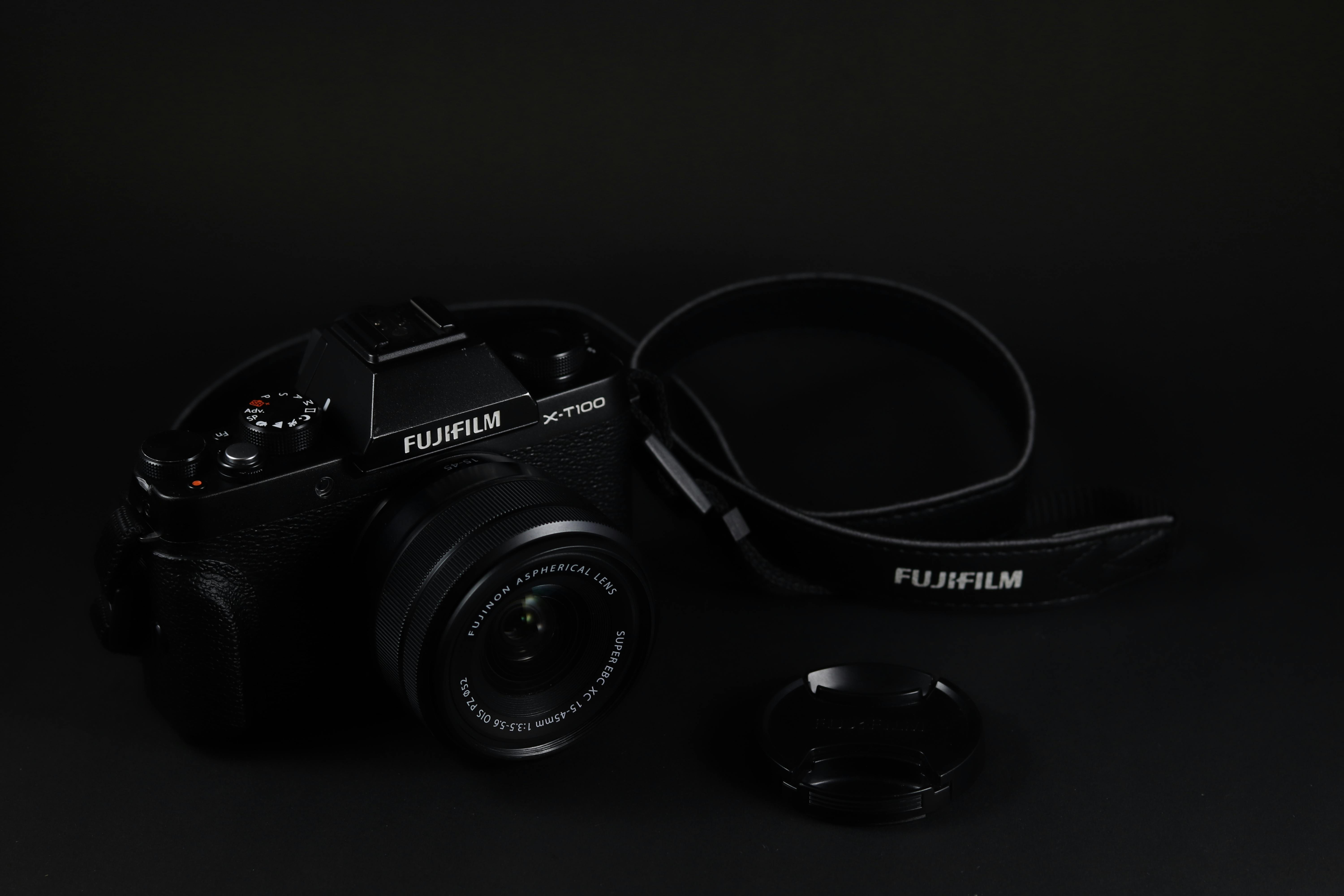 Black Dslr Camera on Black Background · Free Stock Photo