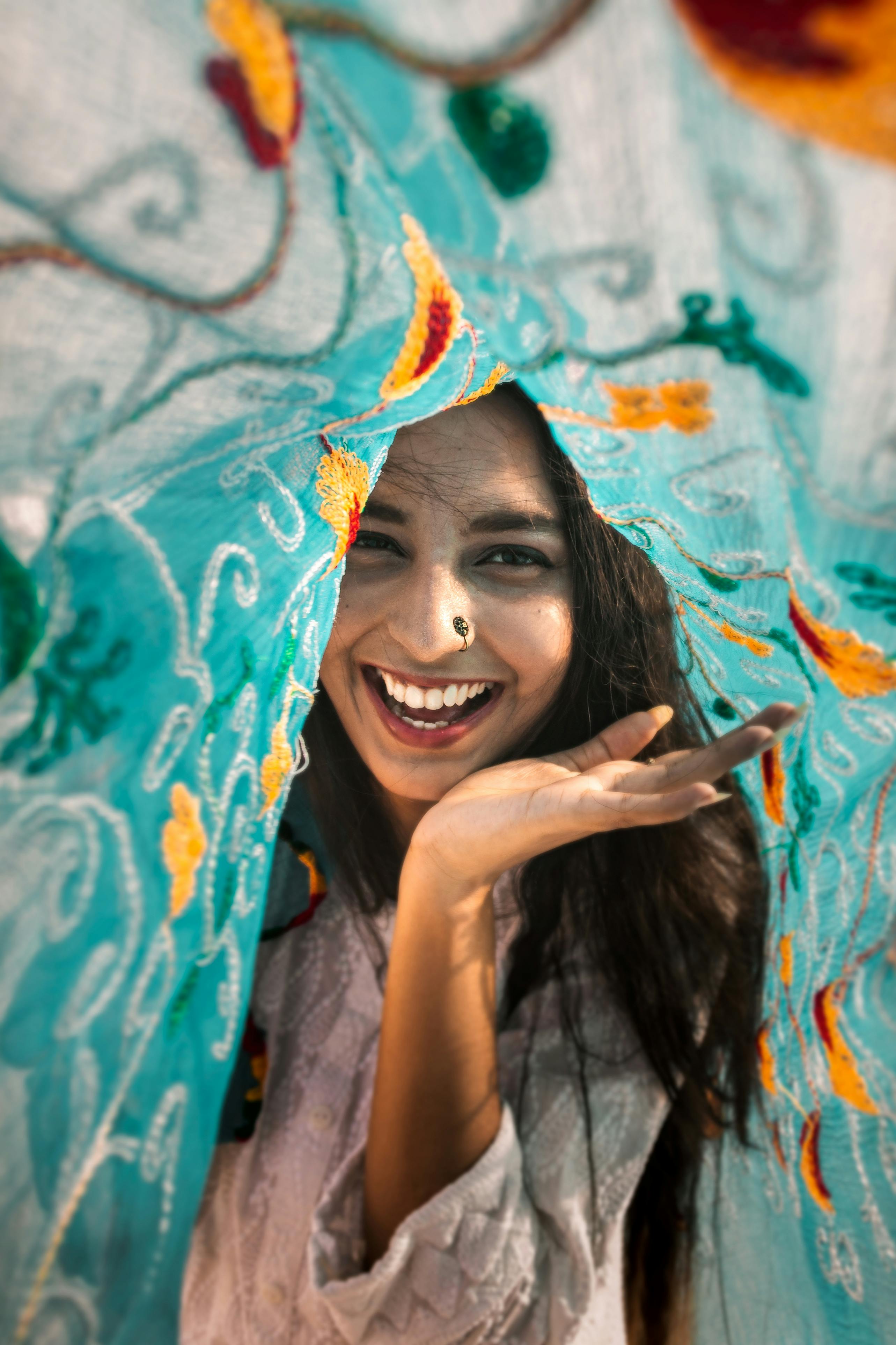 A Woman Smiling at the Camera · Free Stock Photo