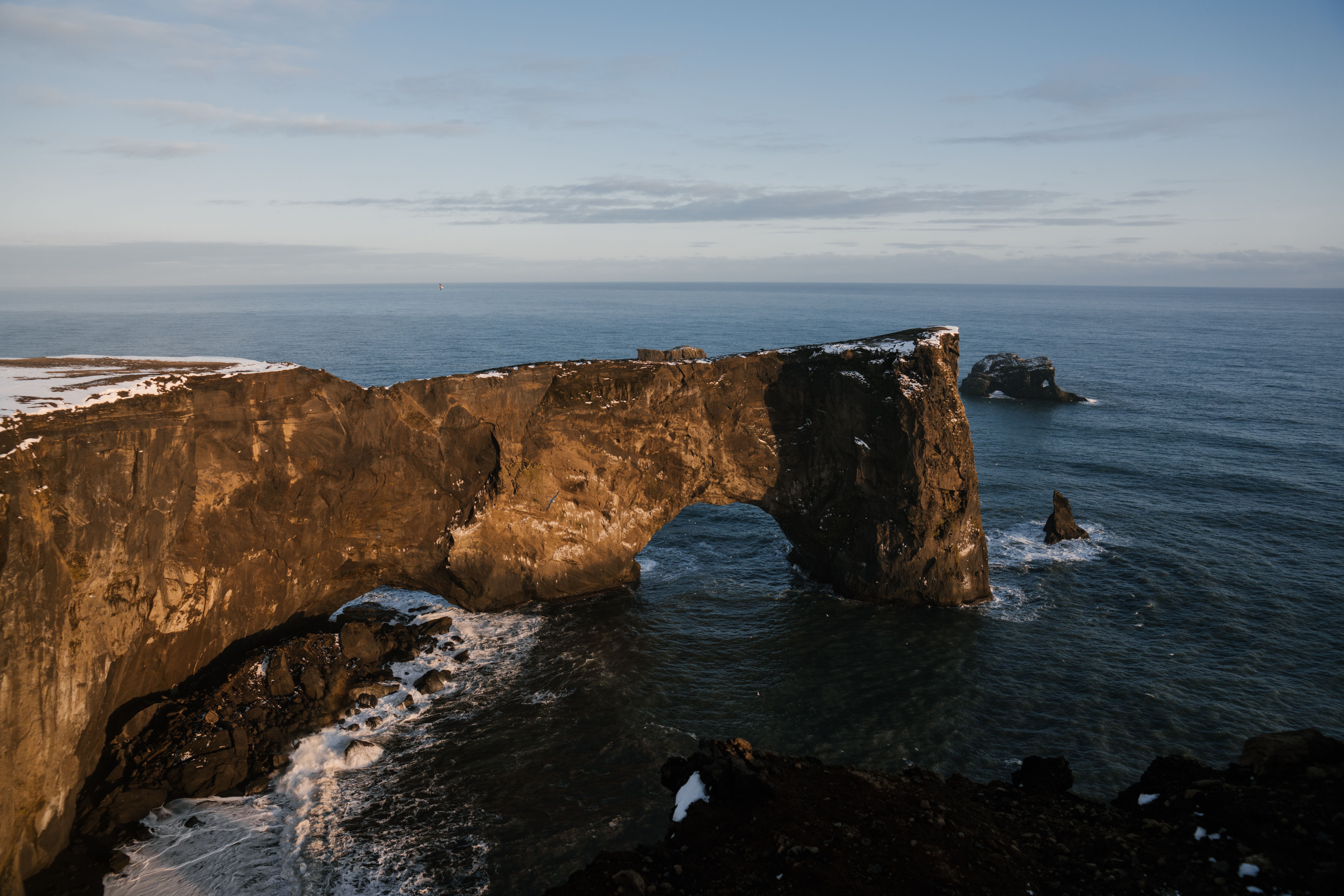 Scenic View of a Seacoast with a Cliff · Free Stock Photo