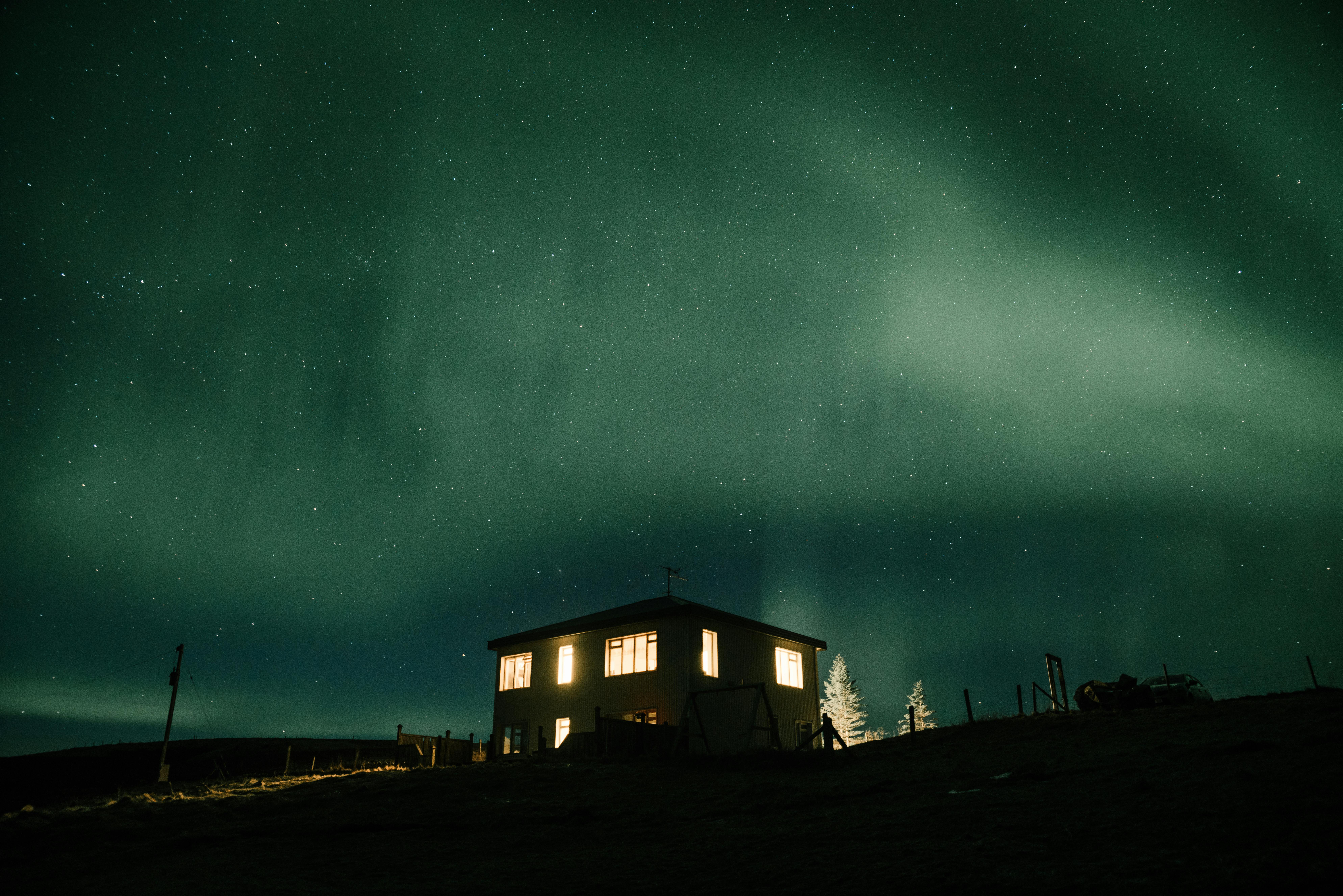 Photo of a Illuminated House with Northern Lights on a Night Sky · Free ...