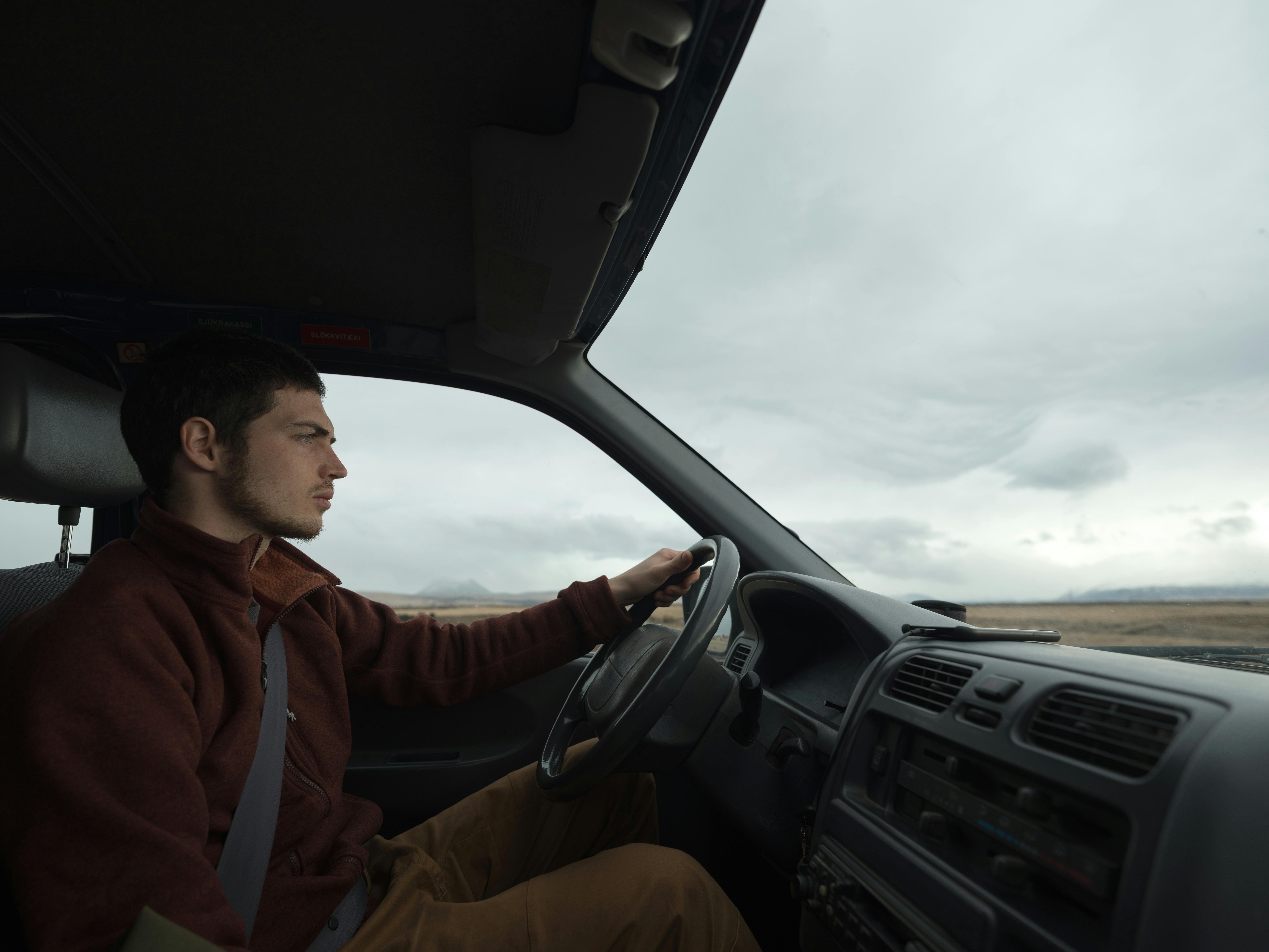 Man Driving a Car · Free Stock Photo