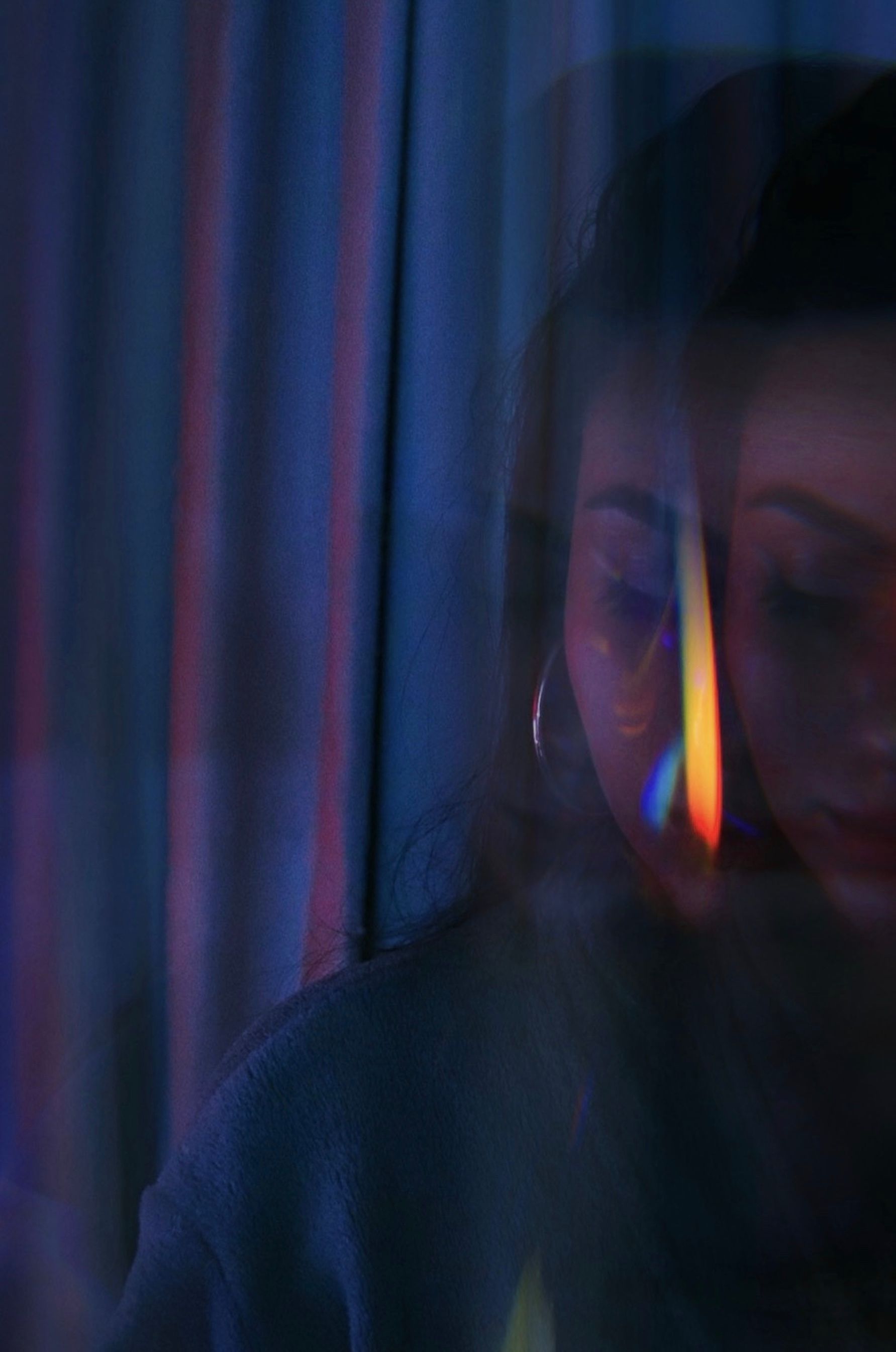 Woman Sitting Beside the Window · Free Stock Photo