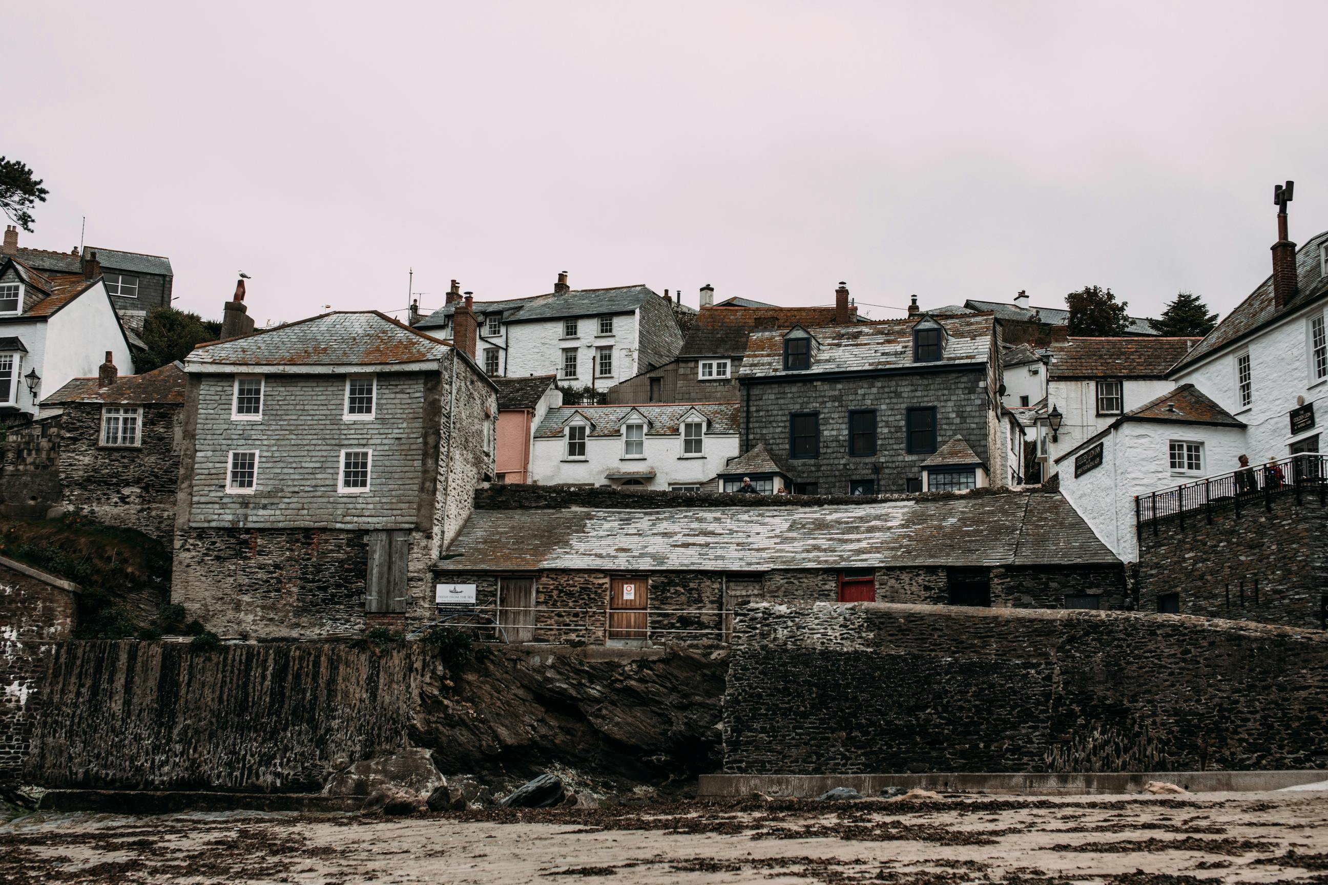 Old town with colorful buildings on hill slope · Free Stock Photo