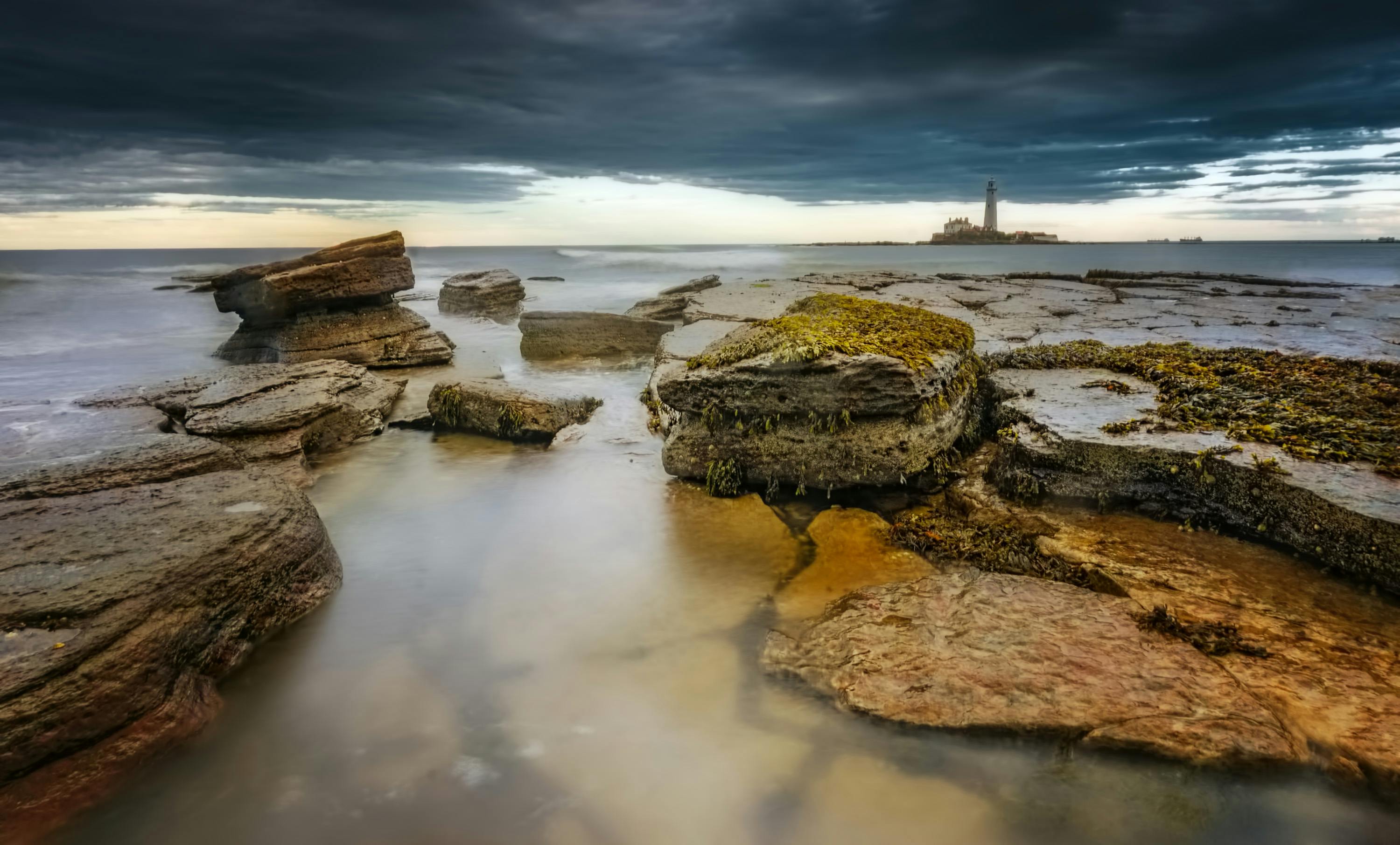 Shiny lighthouse under sky in polar night · Free Stock Photo