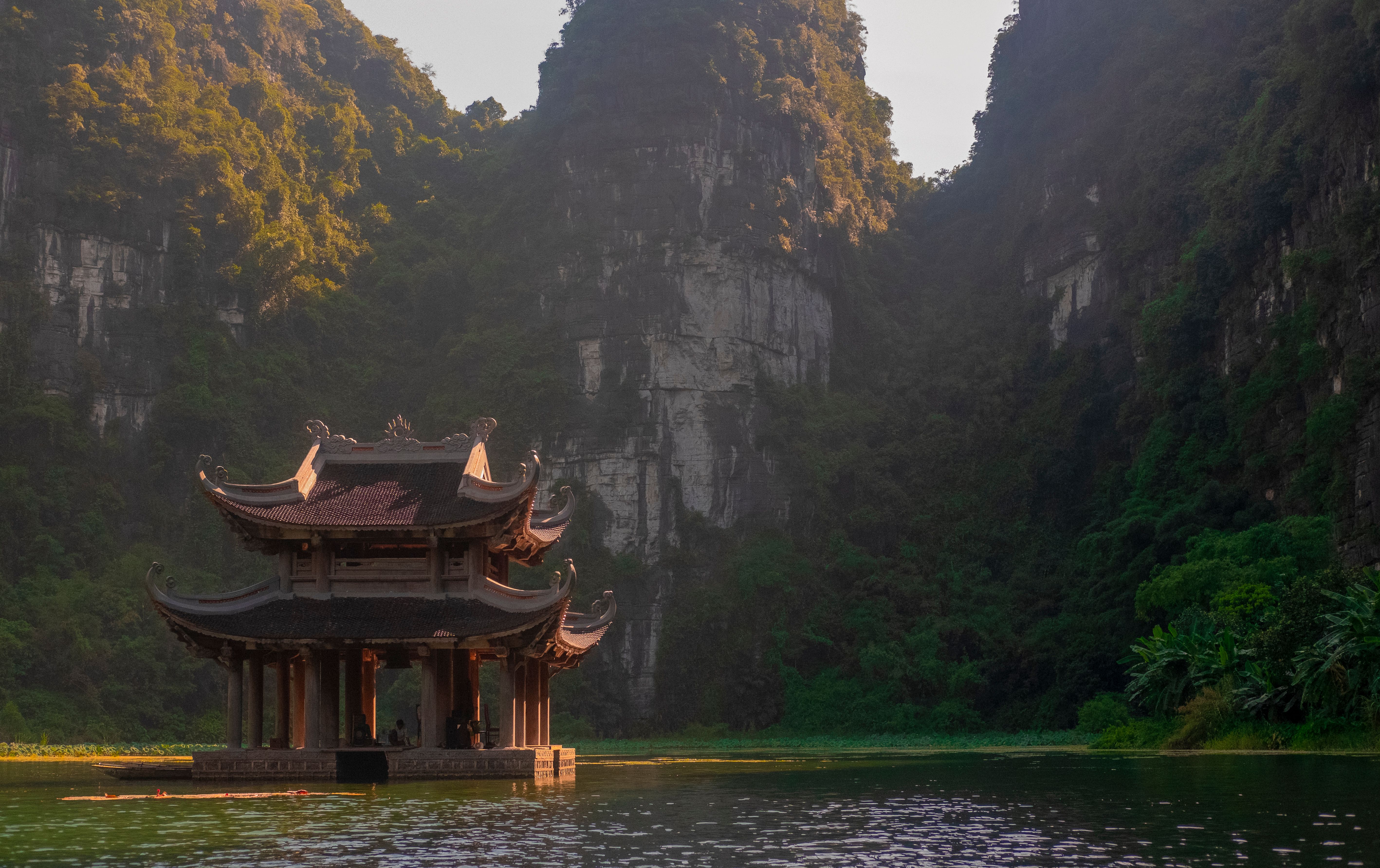 Brown Temple On A Lake · Free Stock Photo