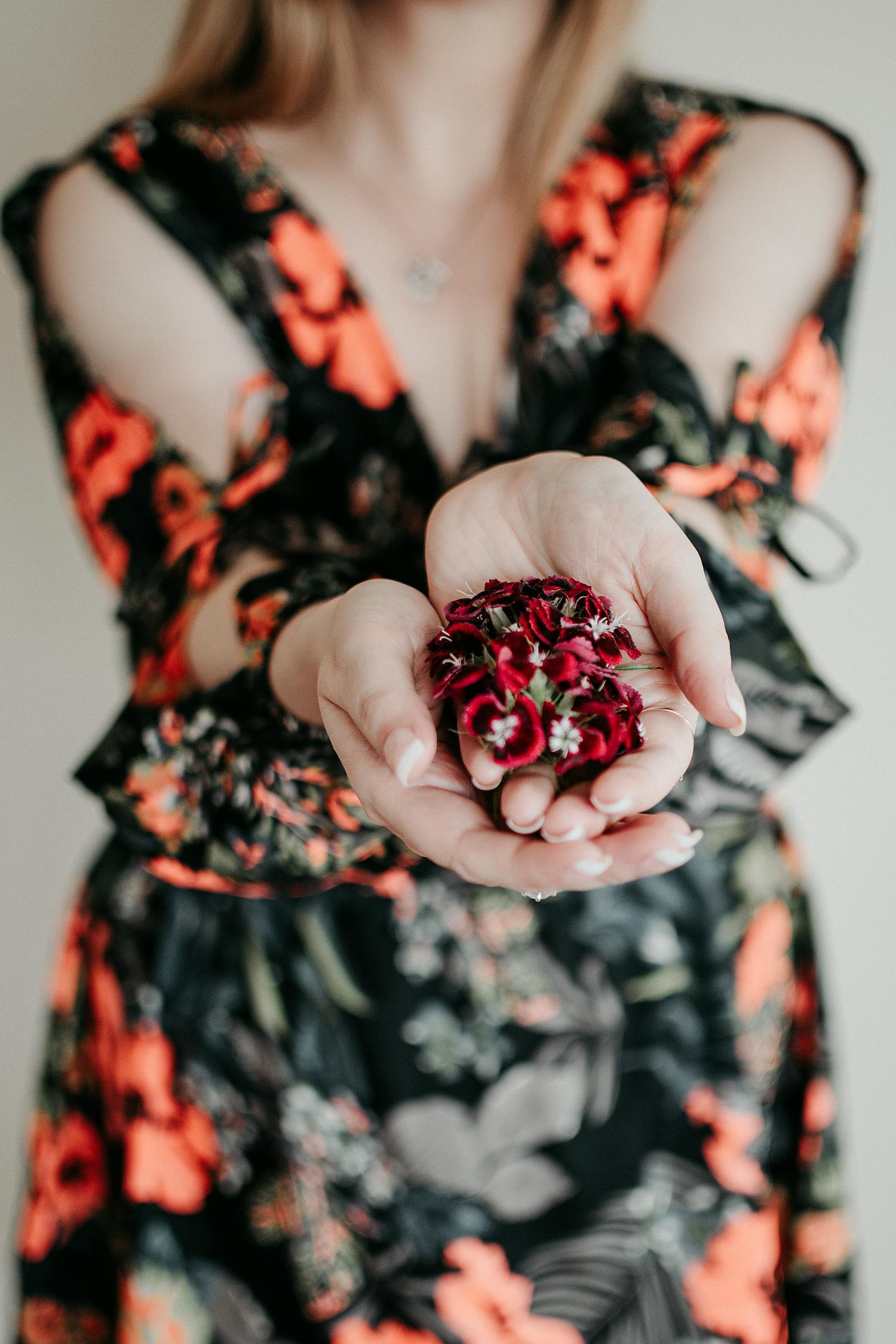 Faceless Woman In Trendy Wear Showing Blooming Flower Free Stock Photo faceless-woman-in-trendy-wear-showing-blooming-flower-free-stock-photo
