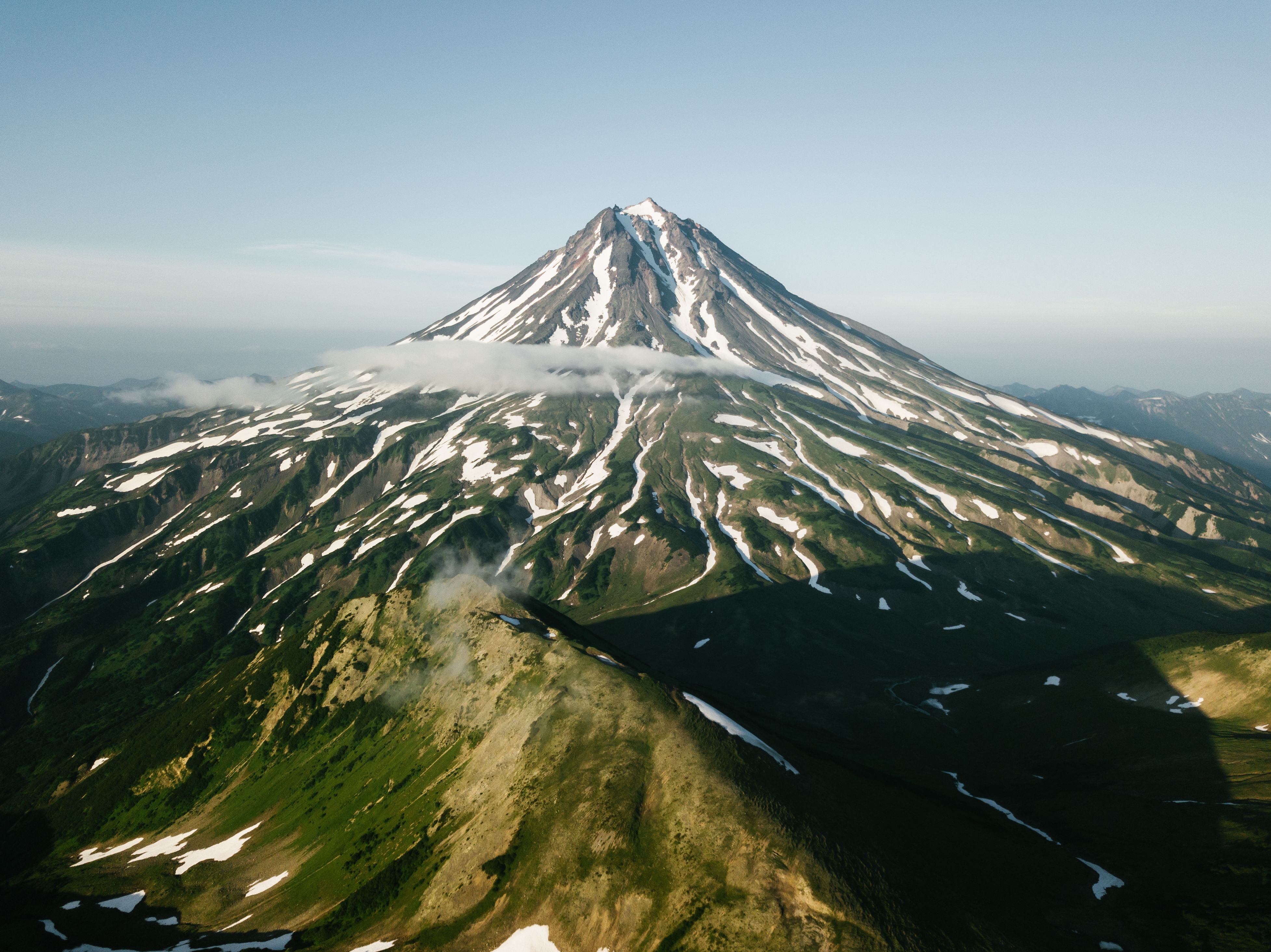 Snow Covered Green Mountain · Free Stock Photo
