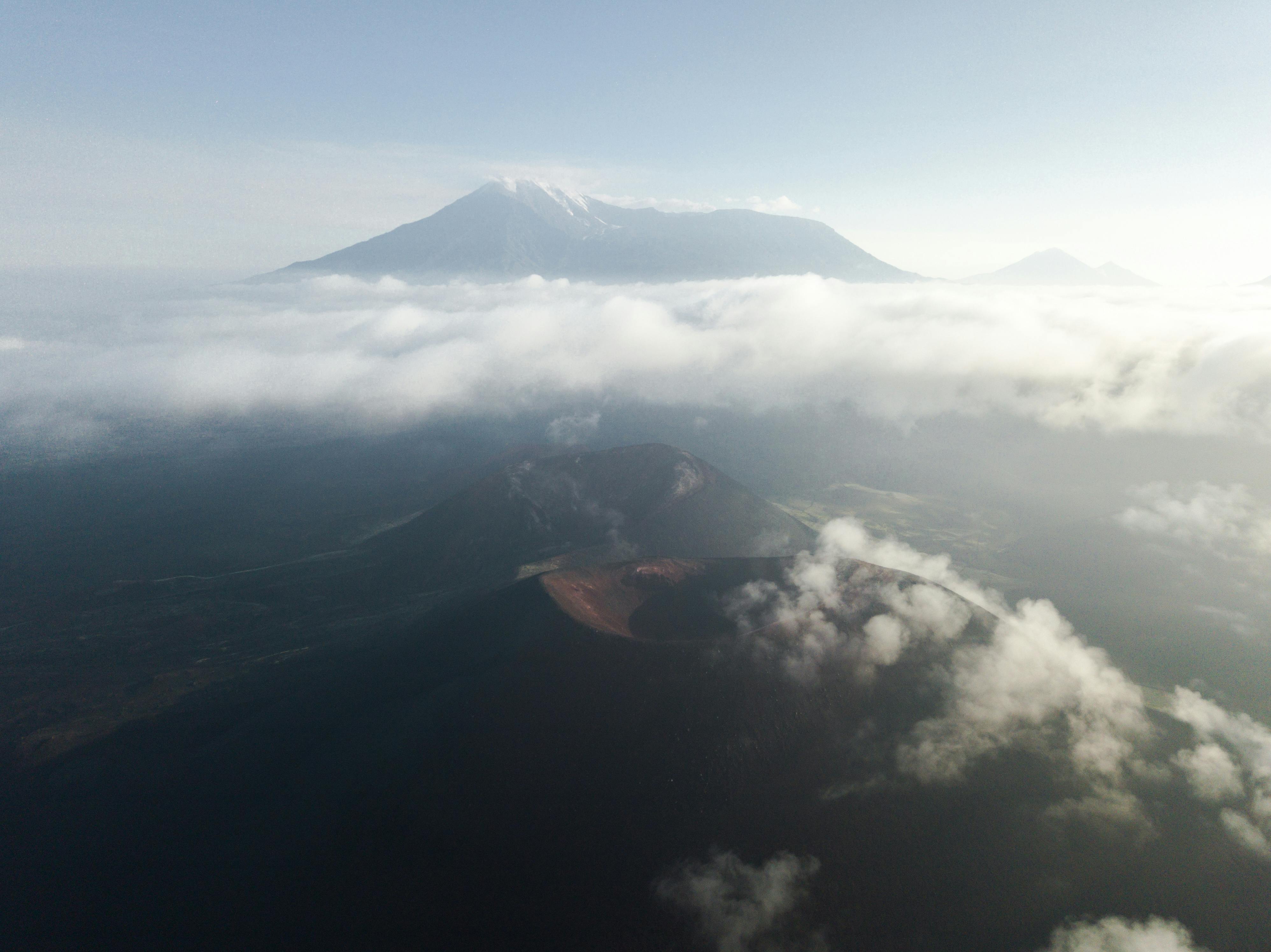 White Clouds over Volcano Crater · Free Stock Photo