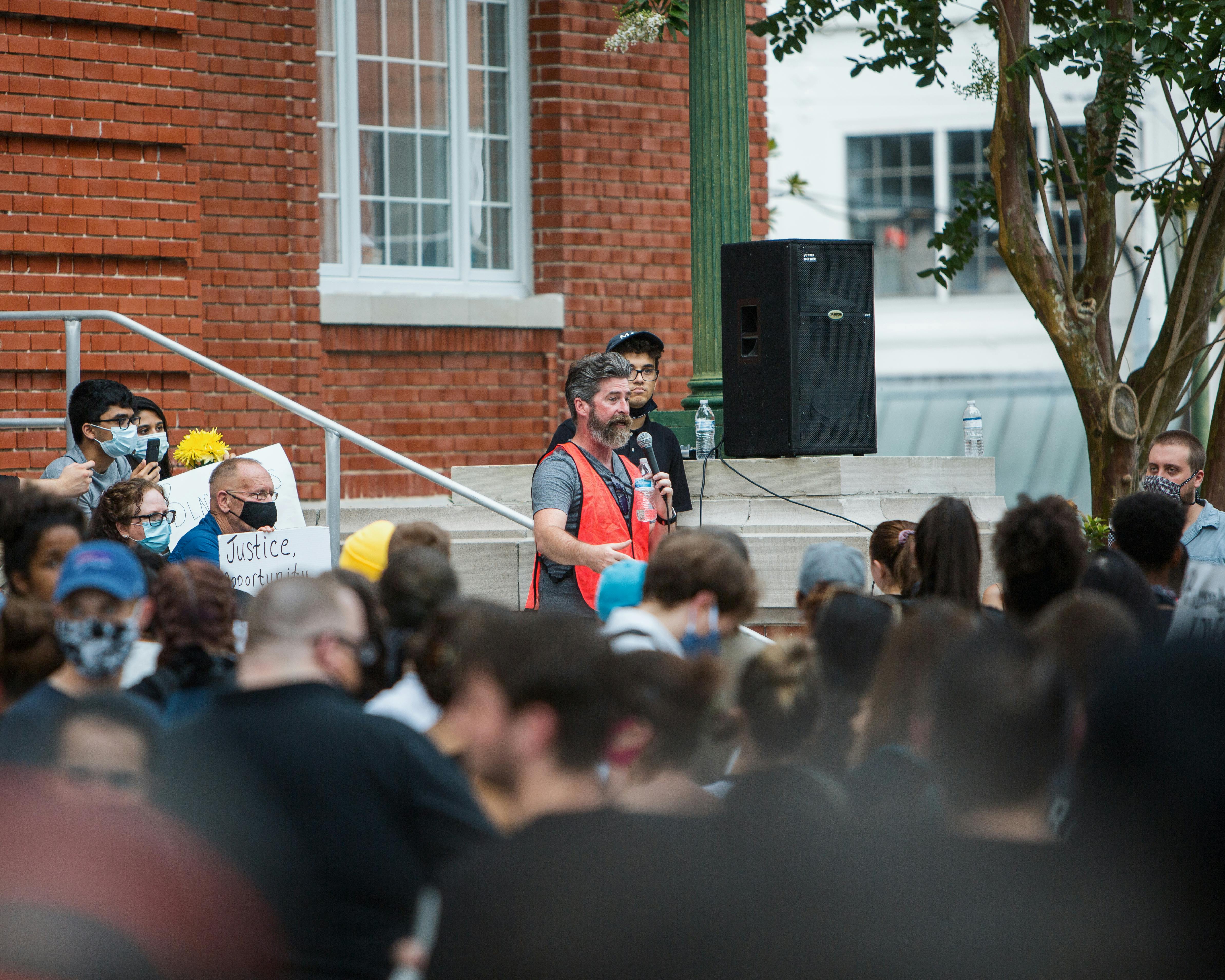 Activist Speaking in Front of Crowd on a Protest · Free Stock Photo