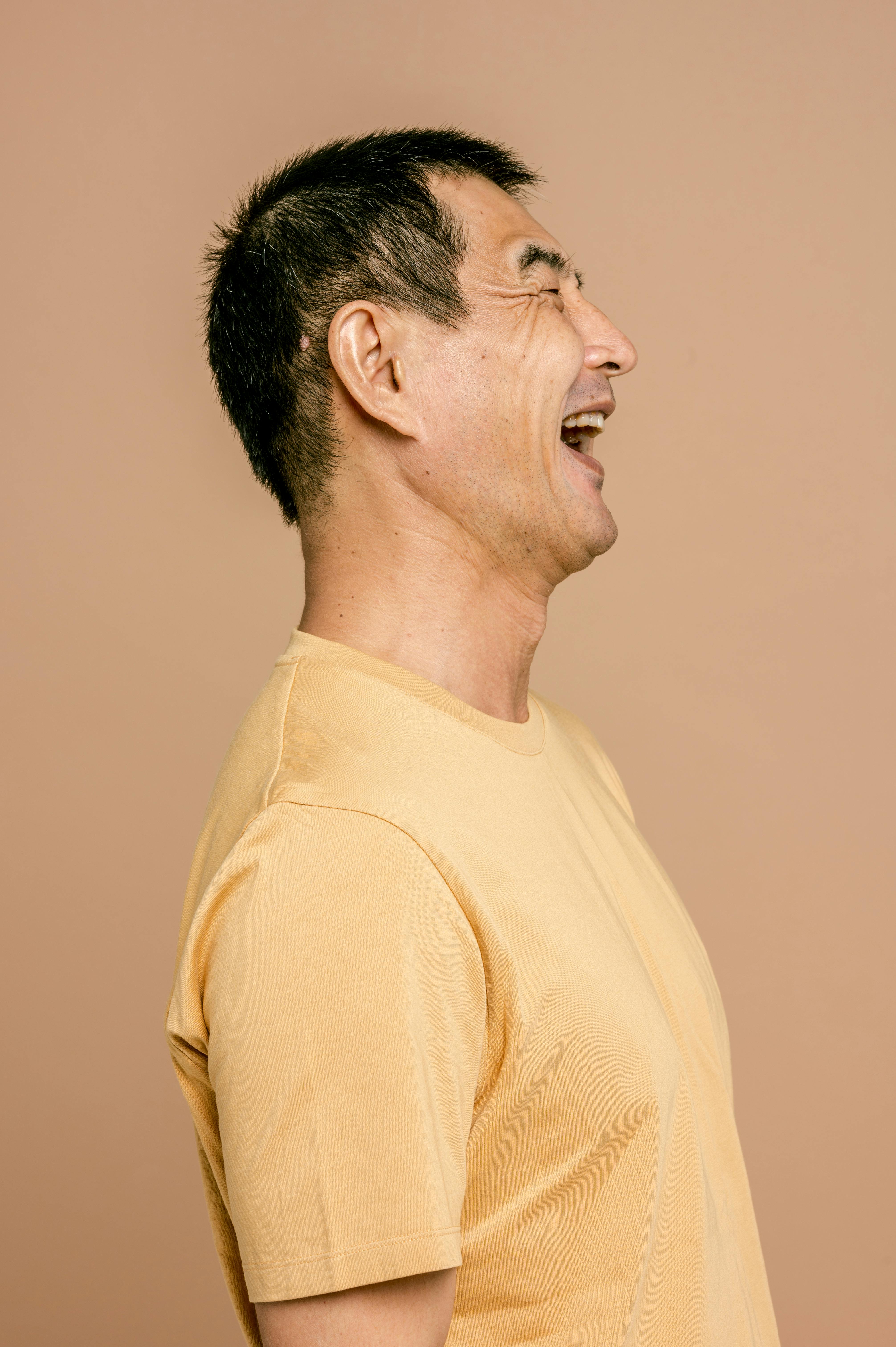 Side View of a Laughing Man · Free Stock Photo