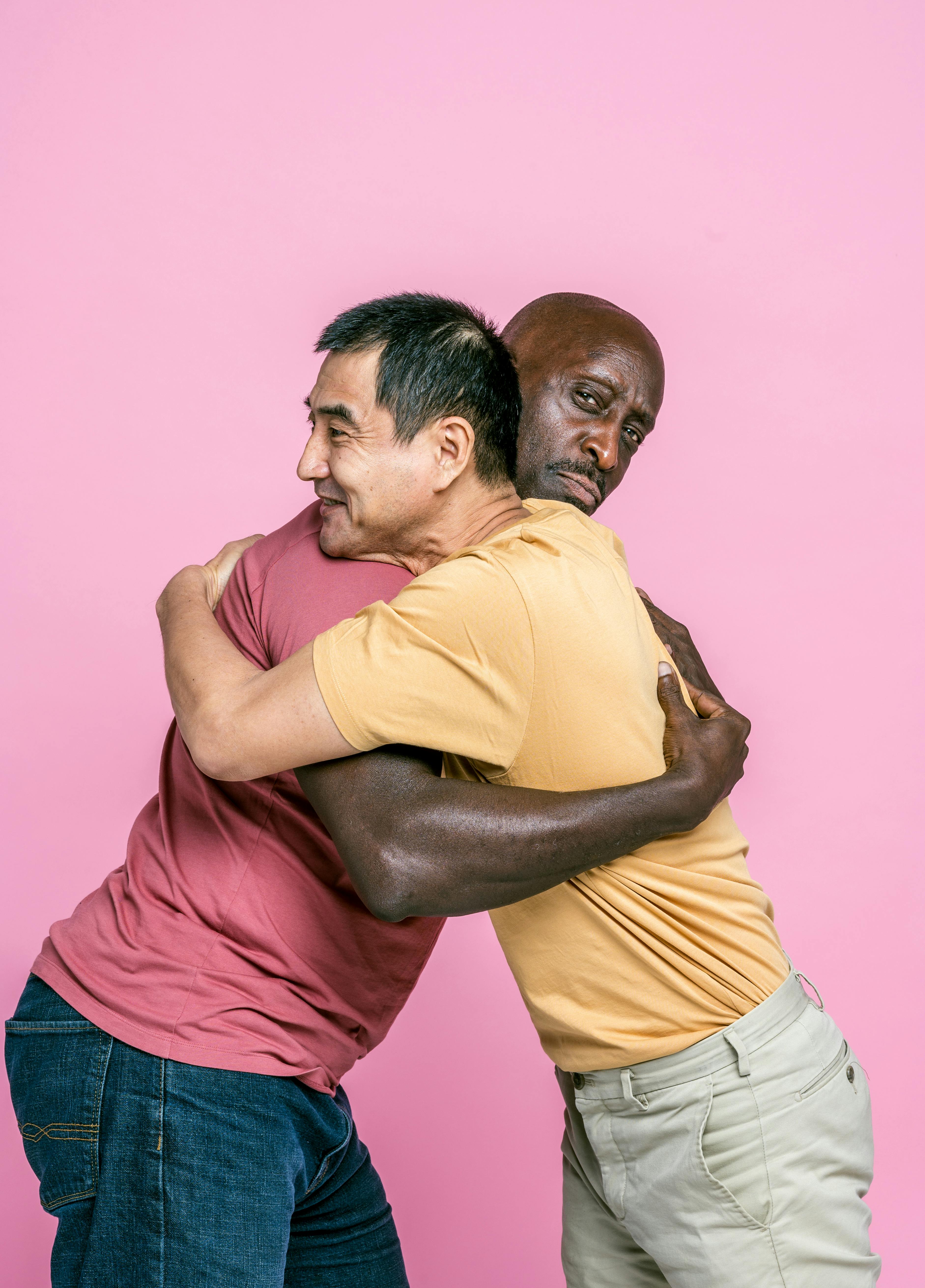 Men Greeting with a Hug · Free Stock Photo