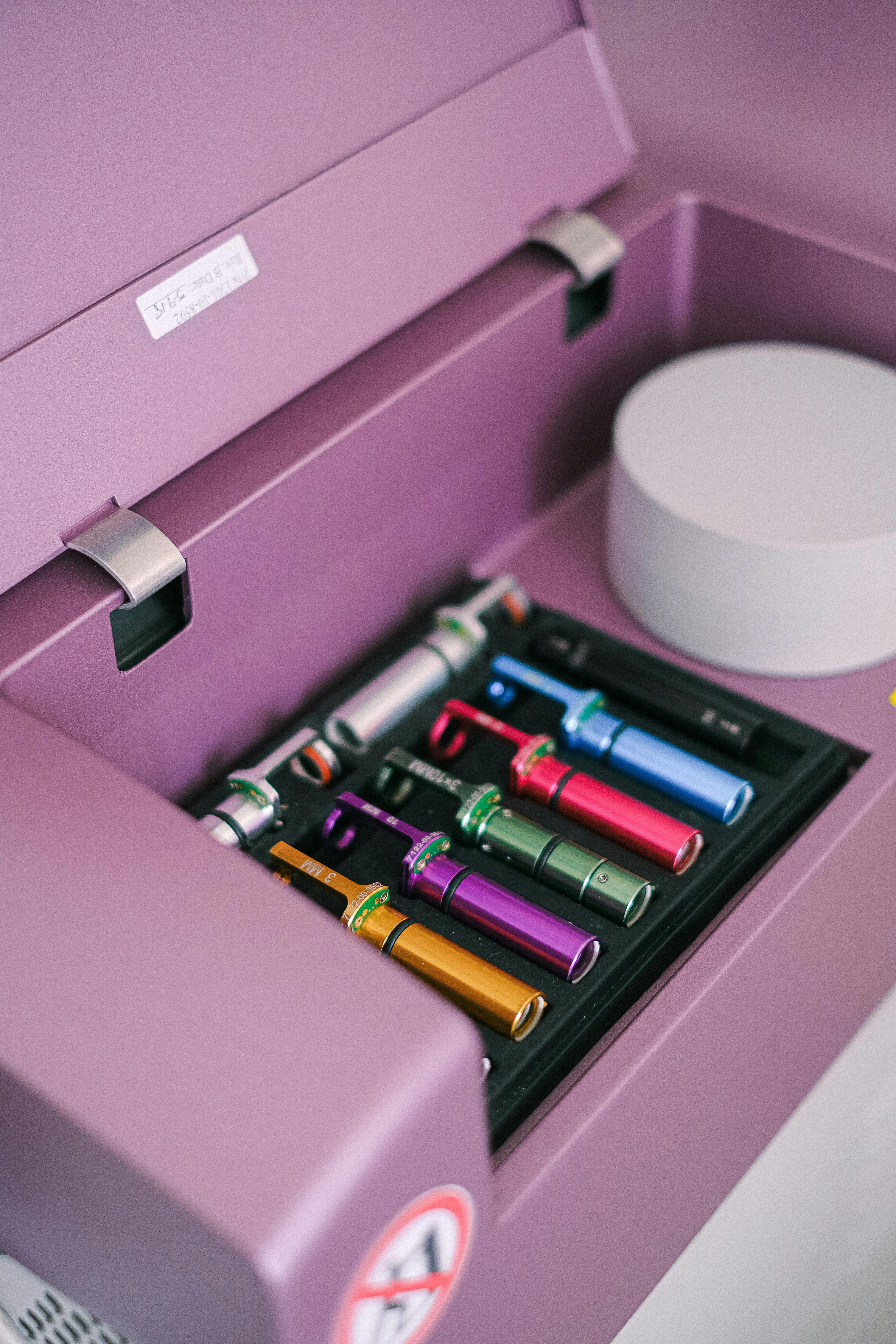 Colorful Injection Tubes in a Lilac Box · Free Stock Photo