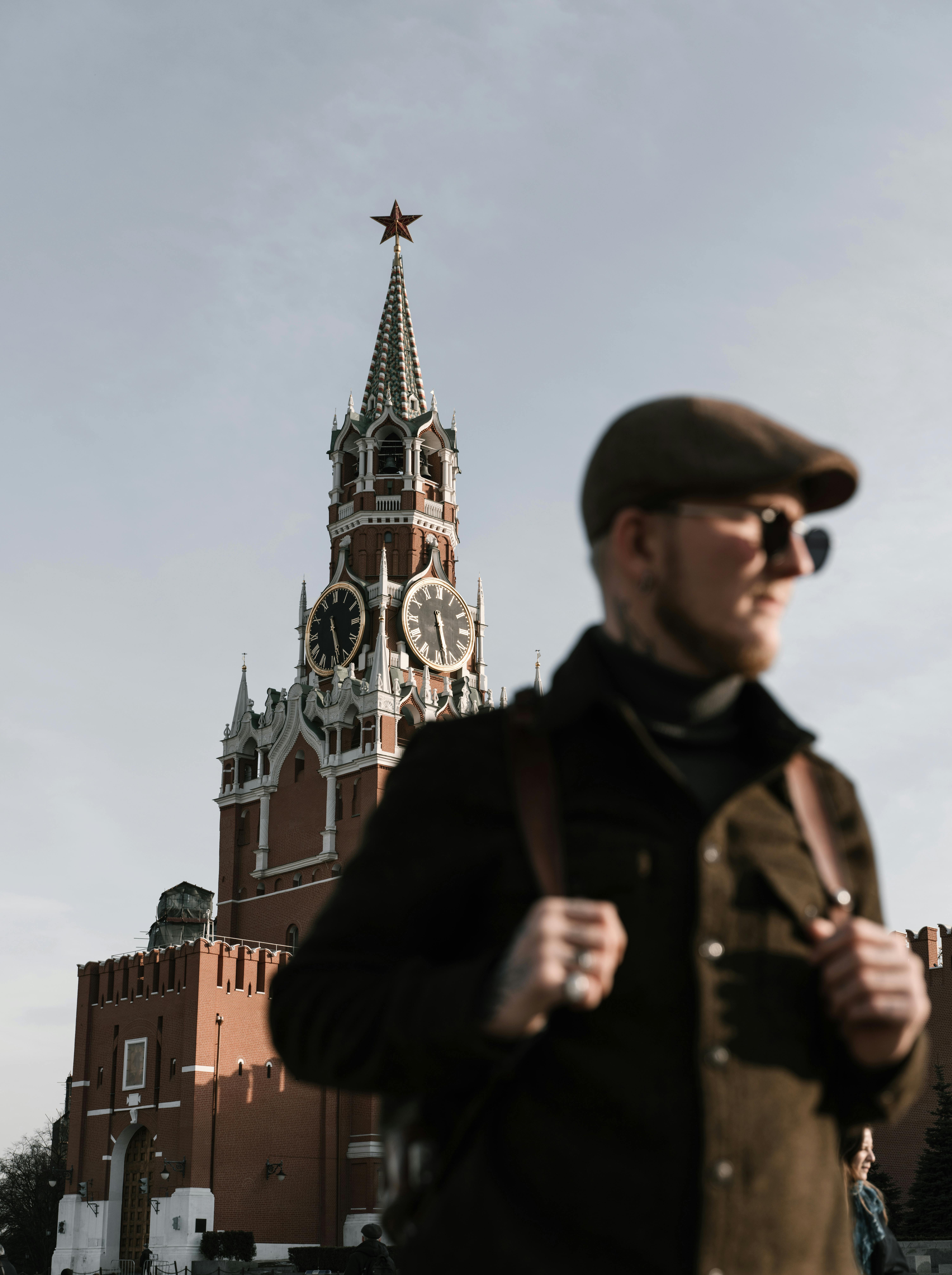 Man near Kremlin Tower · Free Stock Photo
