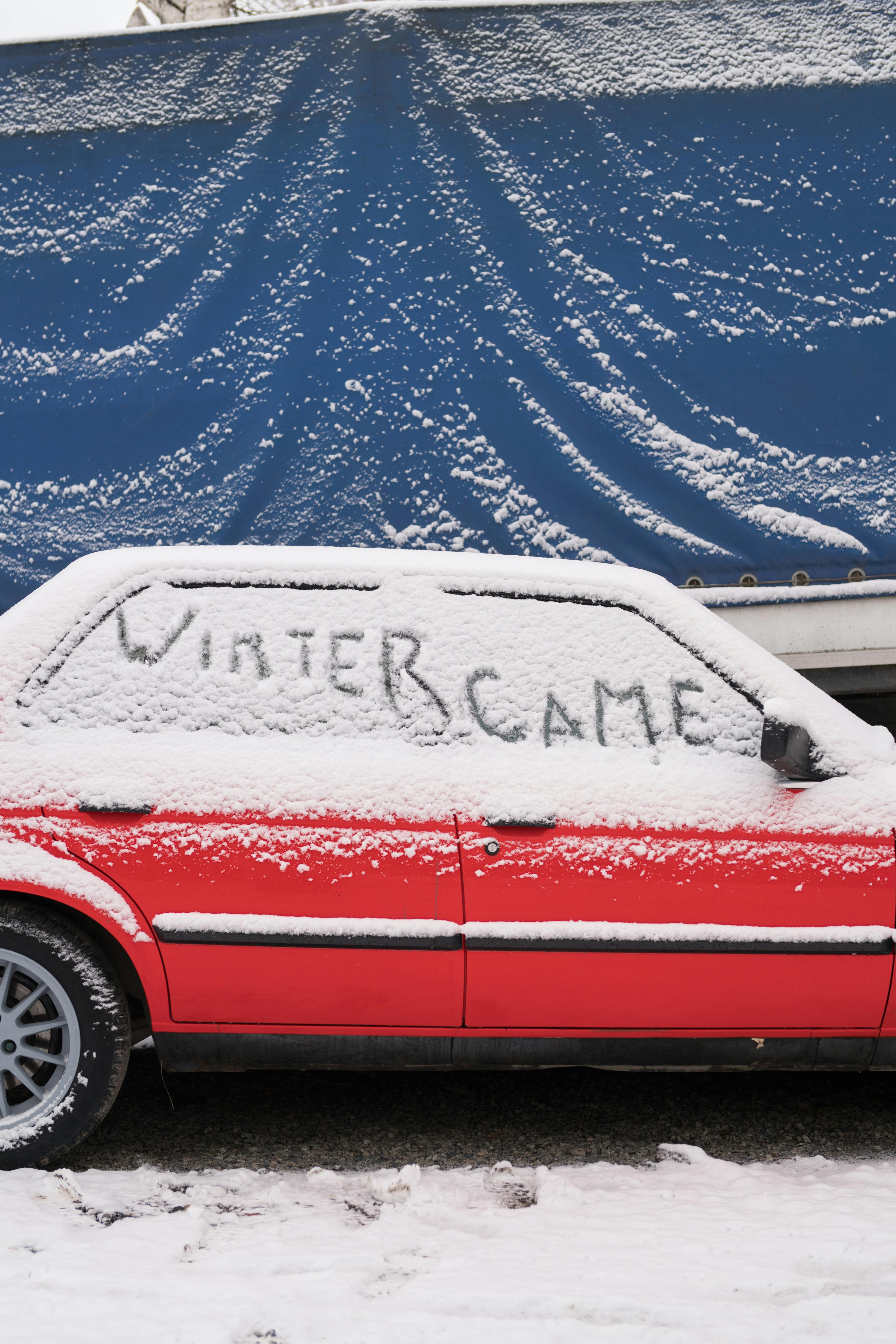 Snow Covered Red Car Parked on Road · Free Stock Photo