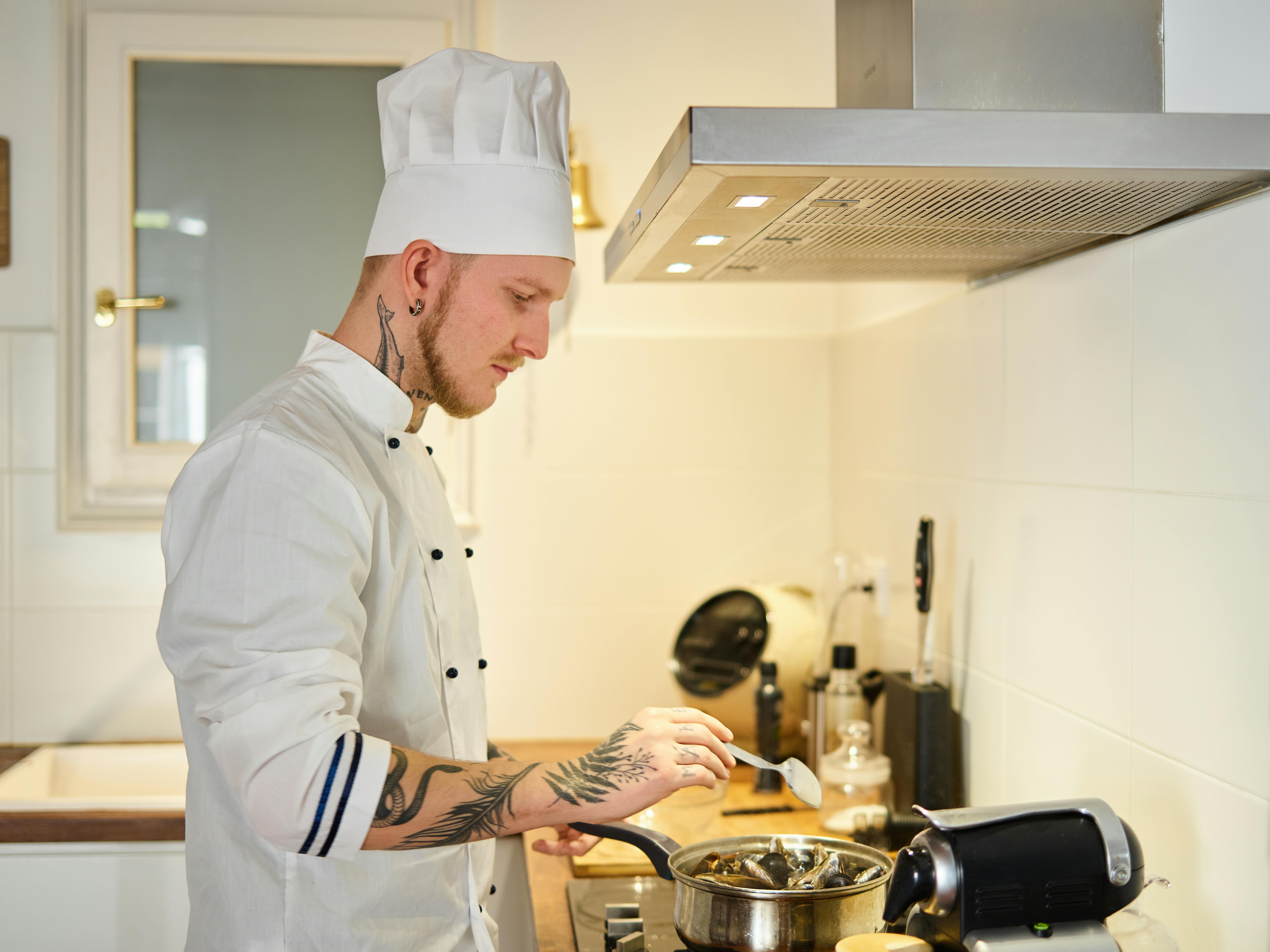 Man in White Chef Uniform Holding Stainless Spoon · Free Stock Photo