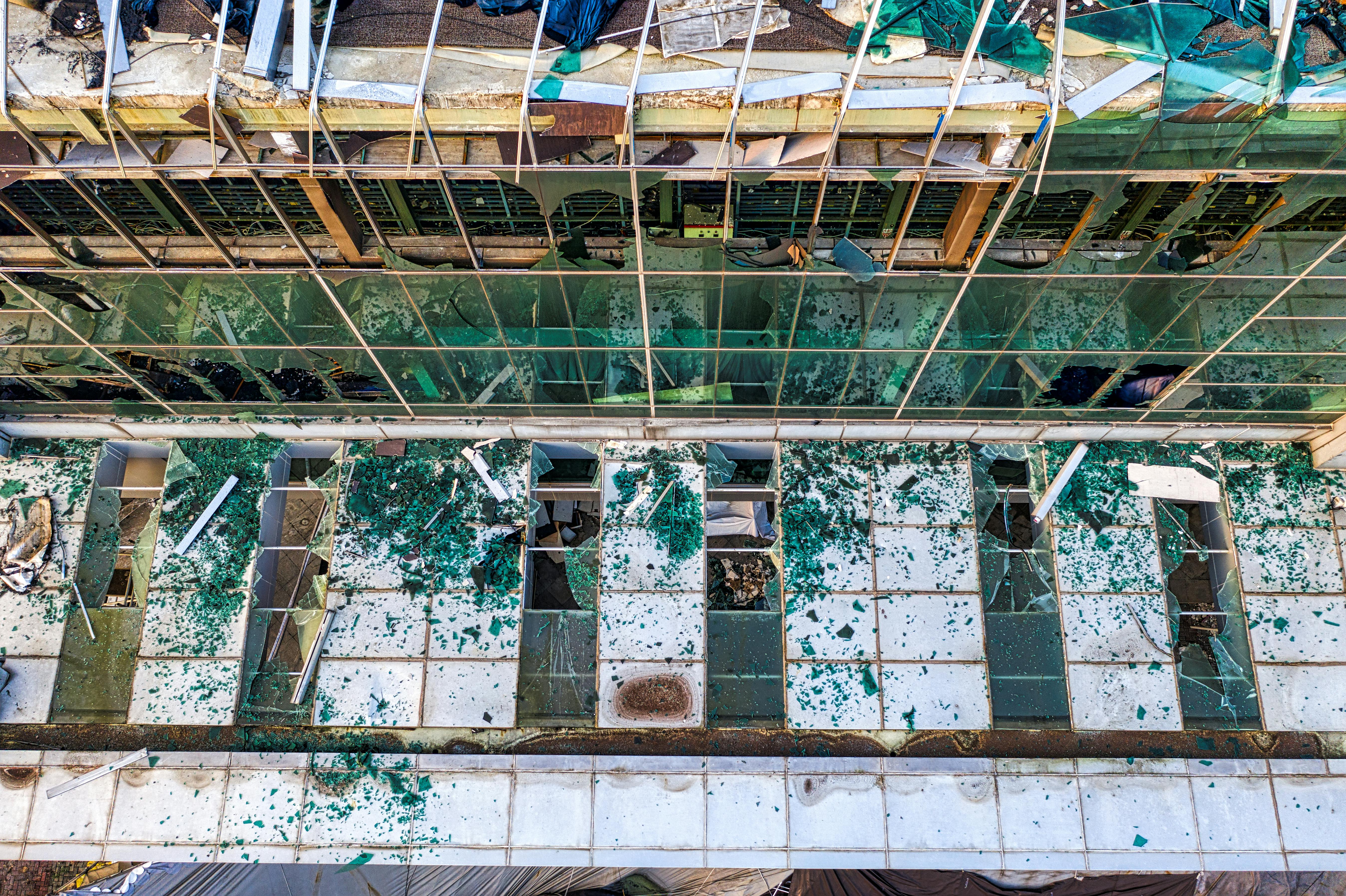 Broken Glass of Destroyed Building · Free Stock Photo