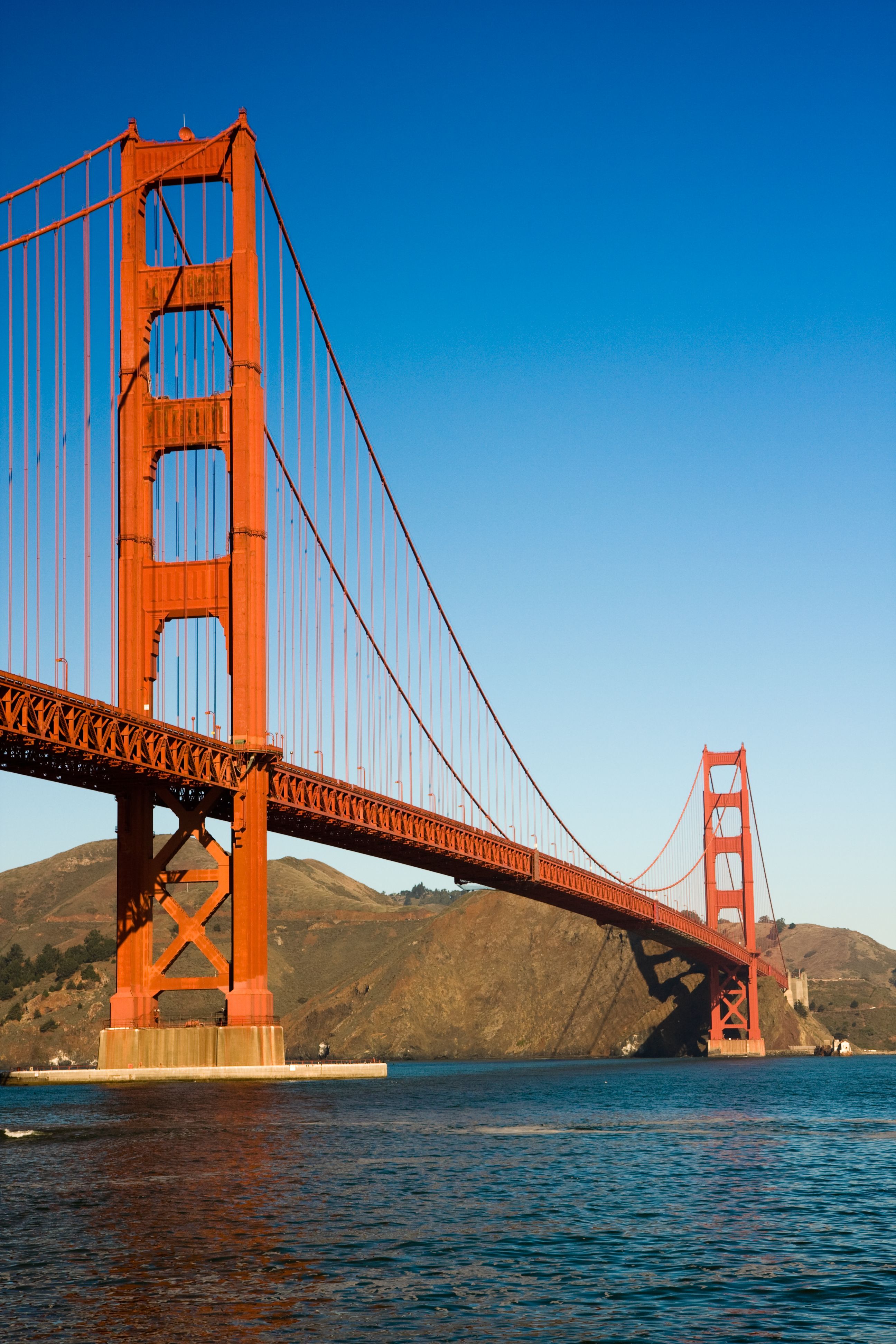 Rescue Helicopter Flying Under Golden Gate Bridge · Free Stock Photo