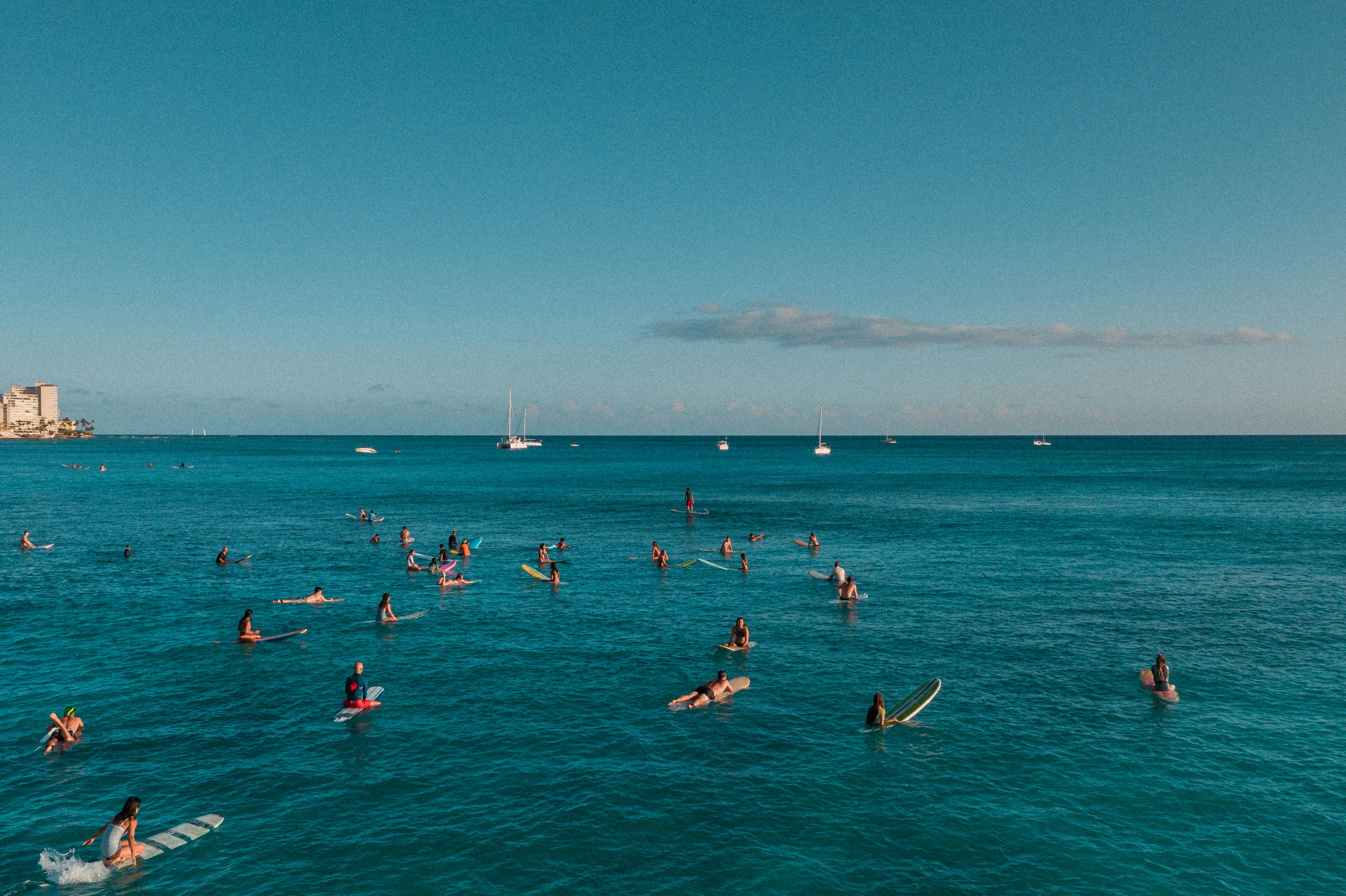 Person Surfing on Sea Waves · Free Stock Photo