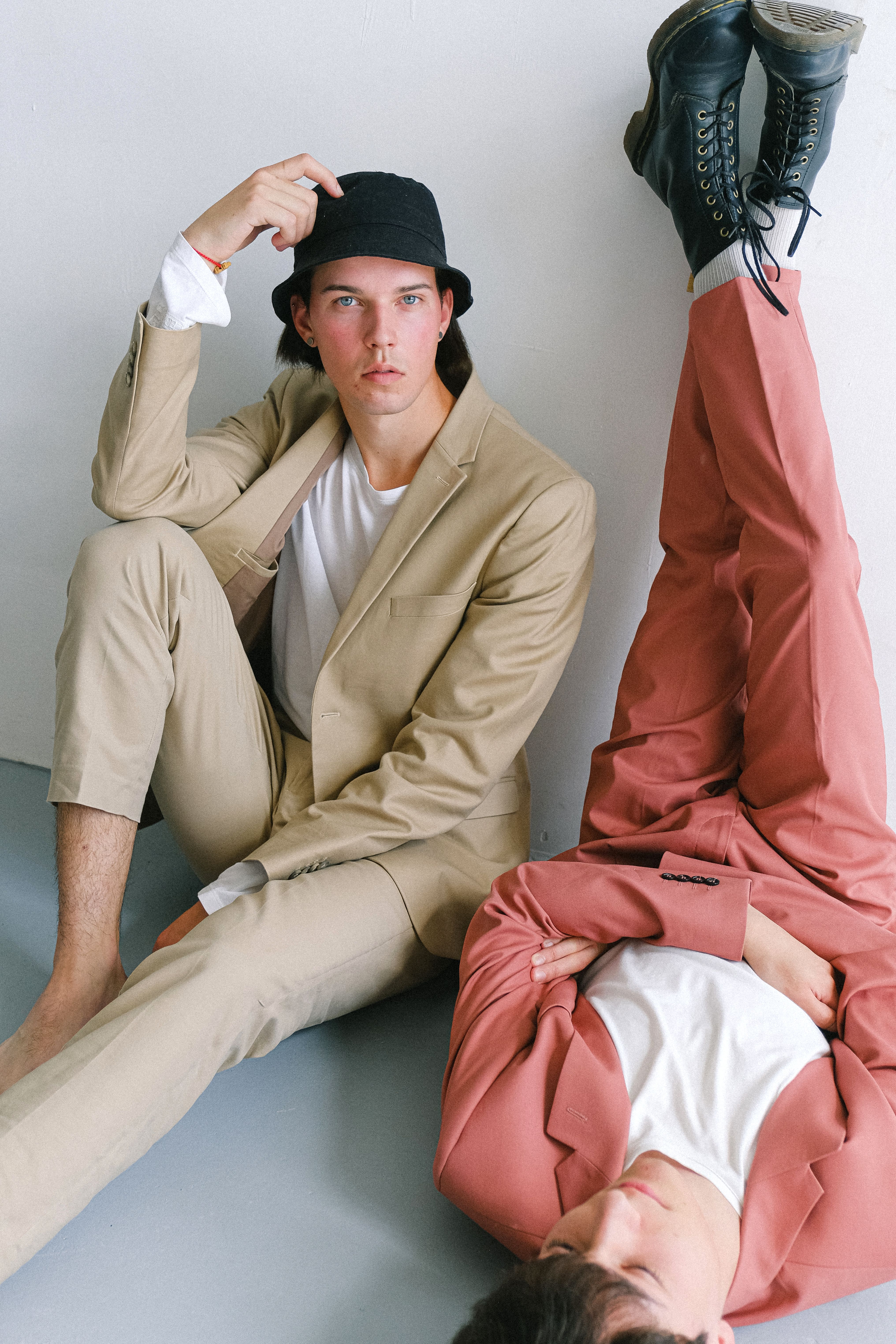 Two Men in Suits Posing · Free Stock Photo