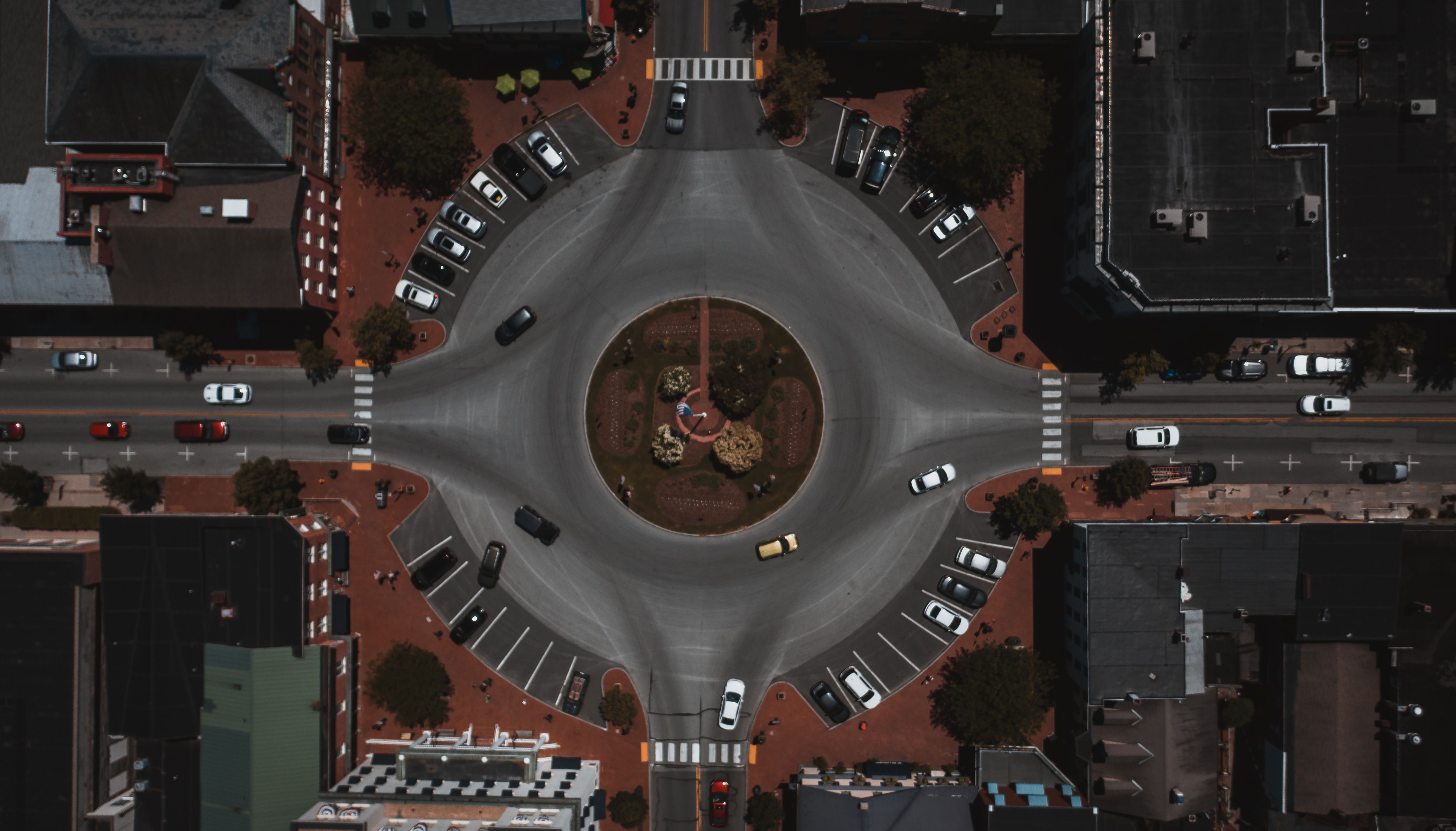 Vehicles Passing On A Roundabout · Free Stock Photo