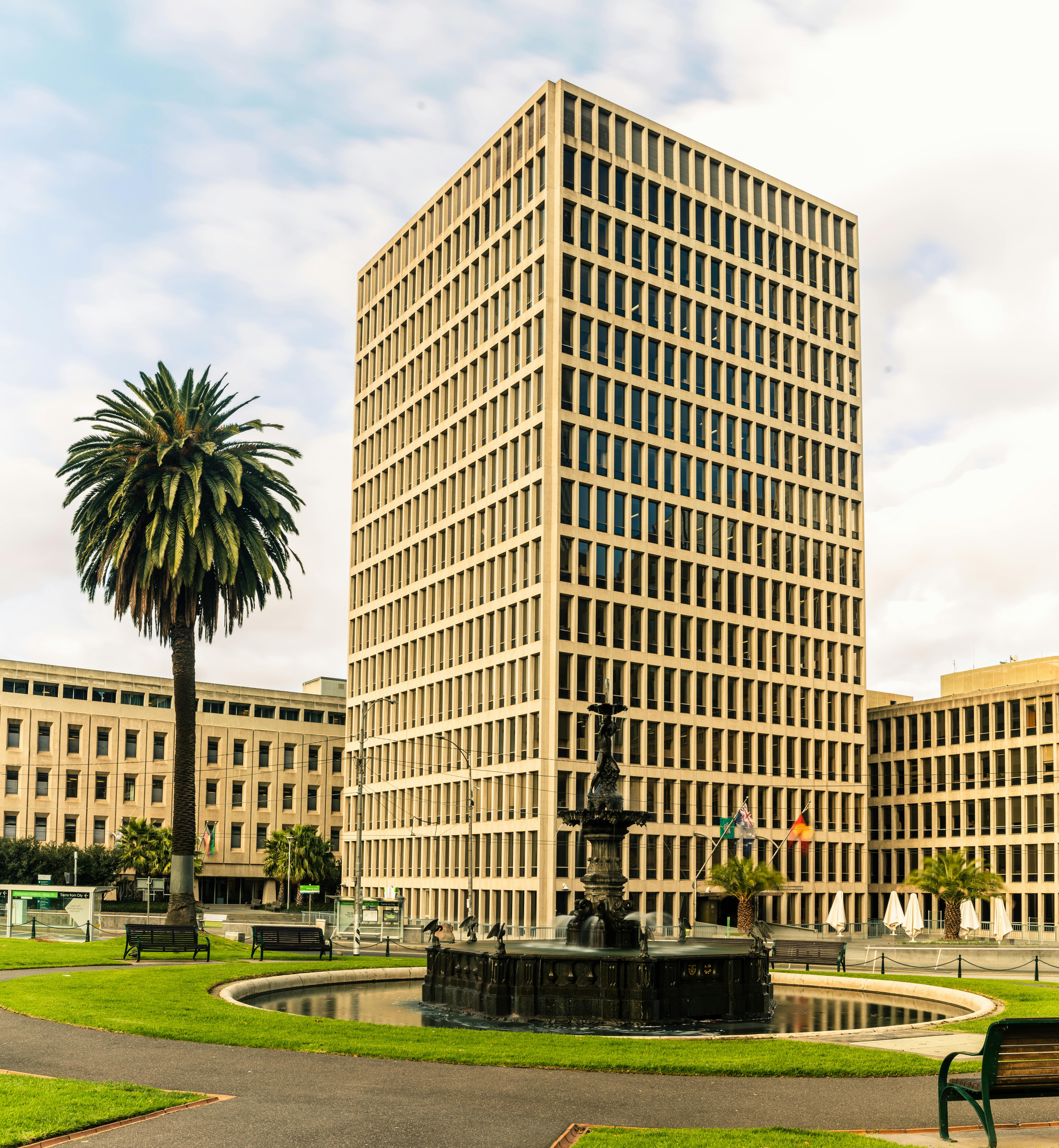 Black Tower Near Fountain Under Blue Sky and White Clouds · Free Stock ...