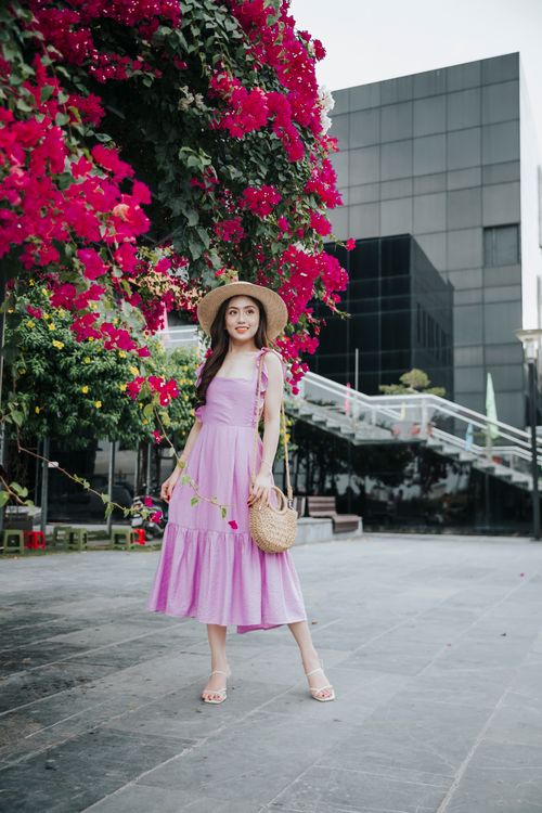 Smiling Stylish Asian Woman In Sundress On Pavement Free Stock Photo smiling-stylish-asian-woman-in-sundress-on-pavement-free-stock-photo