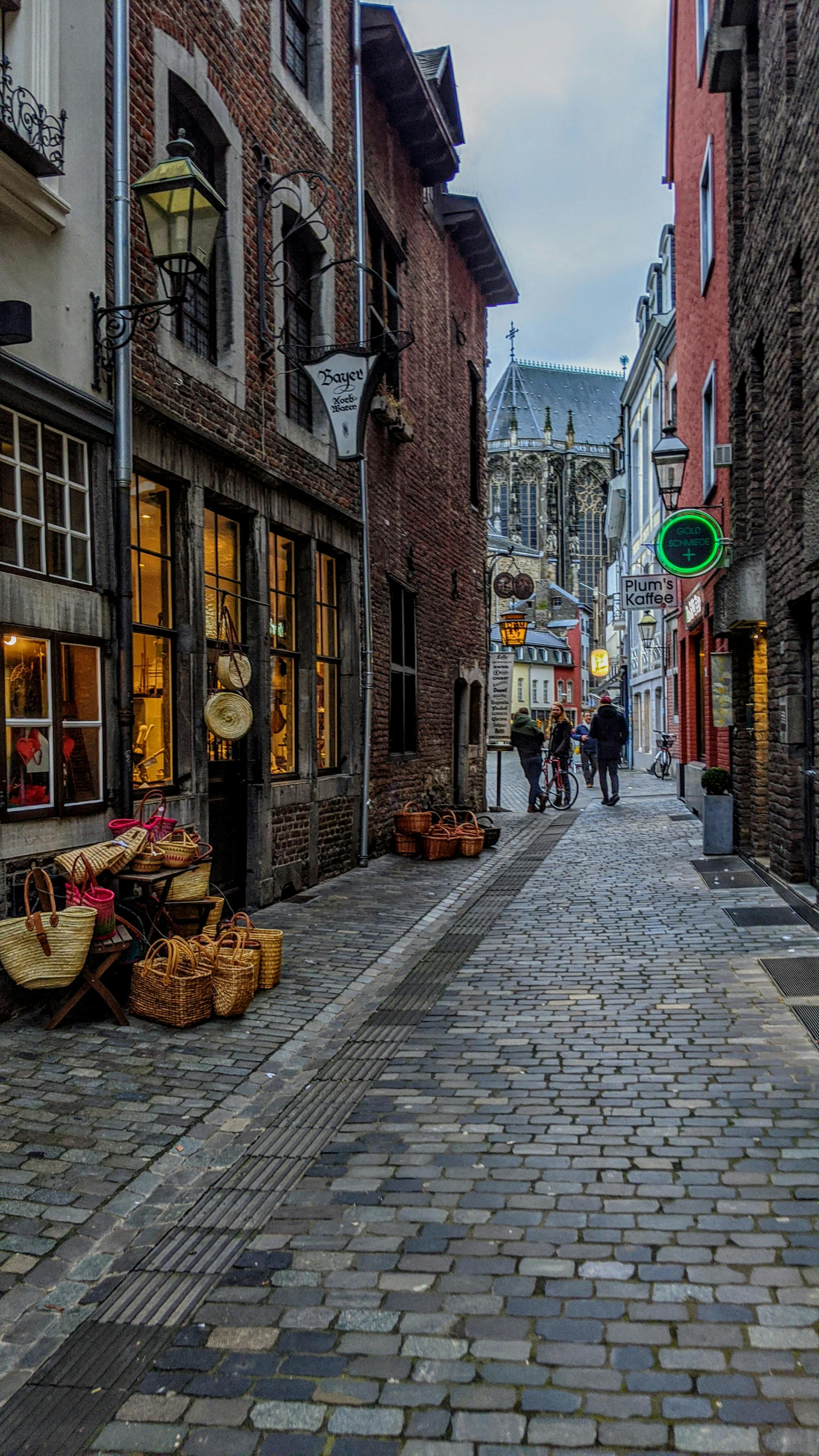 Brick Road Between Buildings with Brick Walls · Free Stock Photo