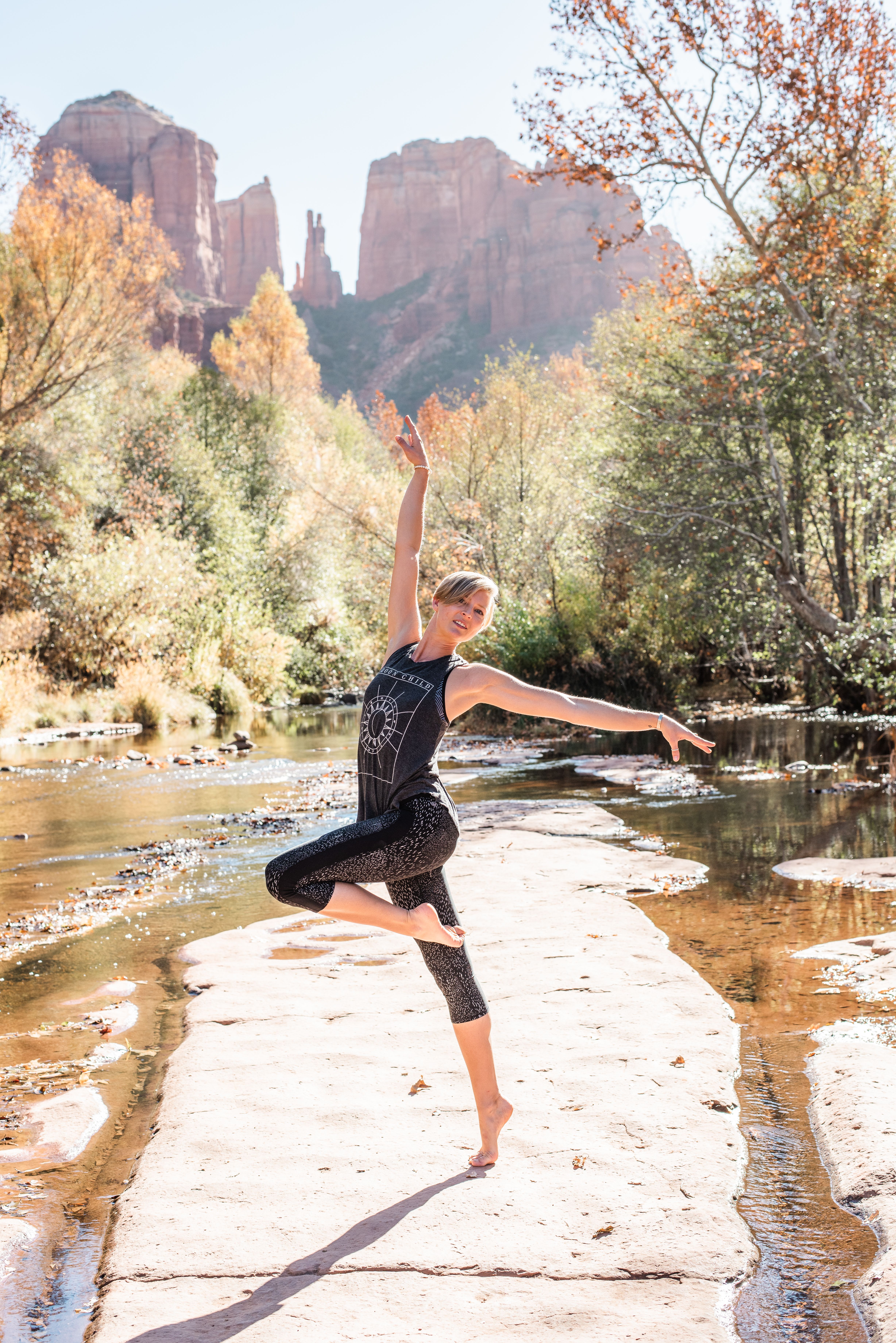 Woman In Ballet Pose Near A River · Free Stock Photo