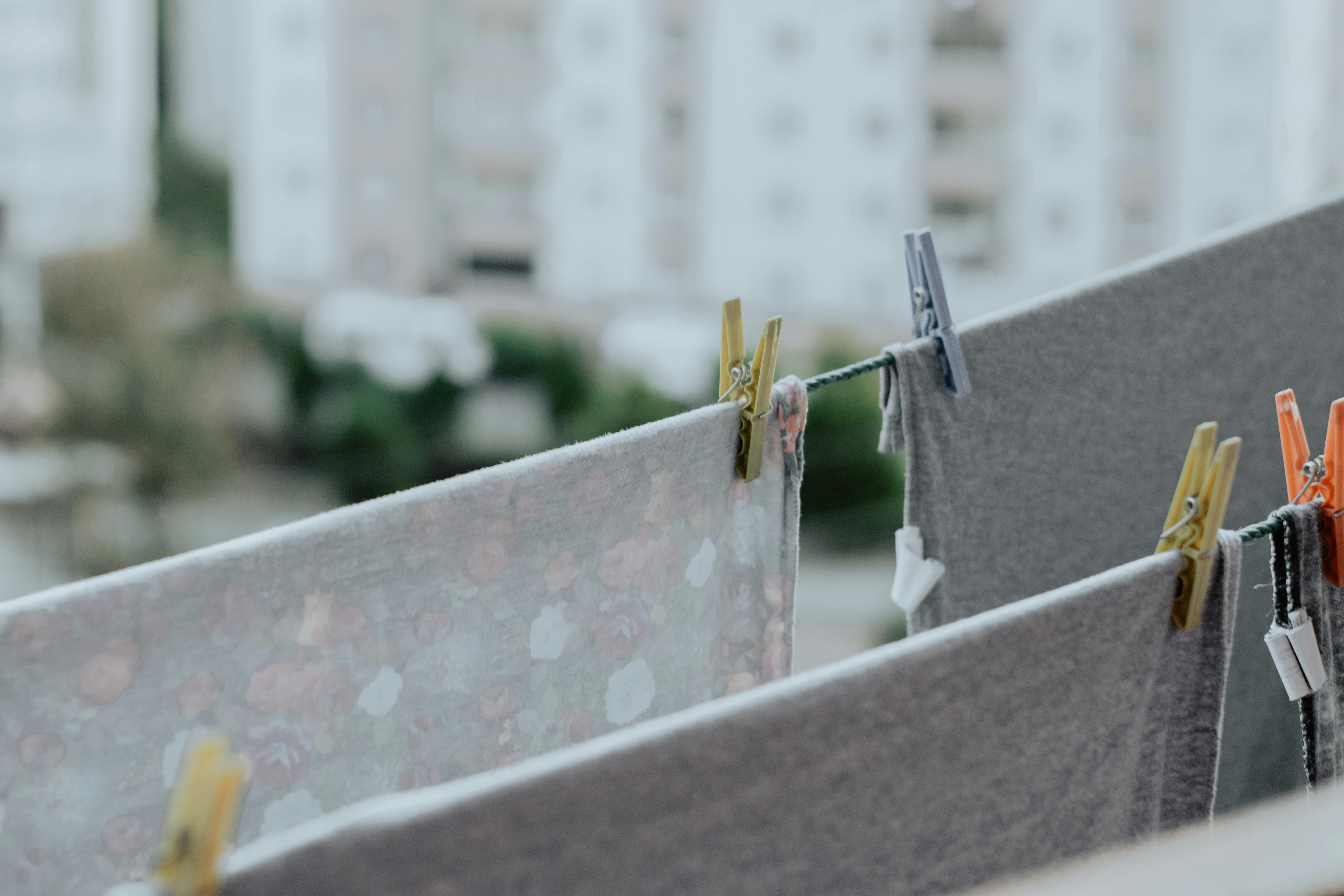 Gray draped cloth hanging in room · Free Stock Photo