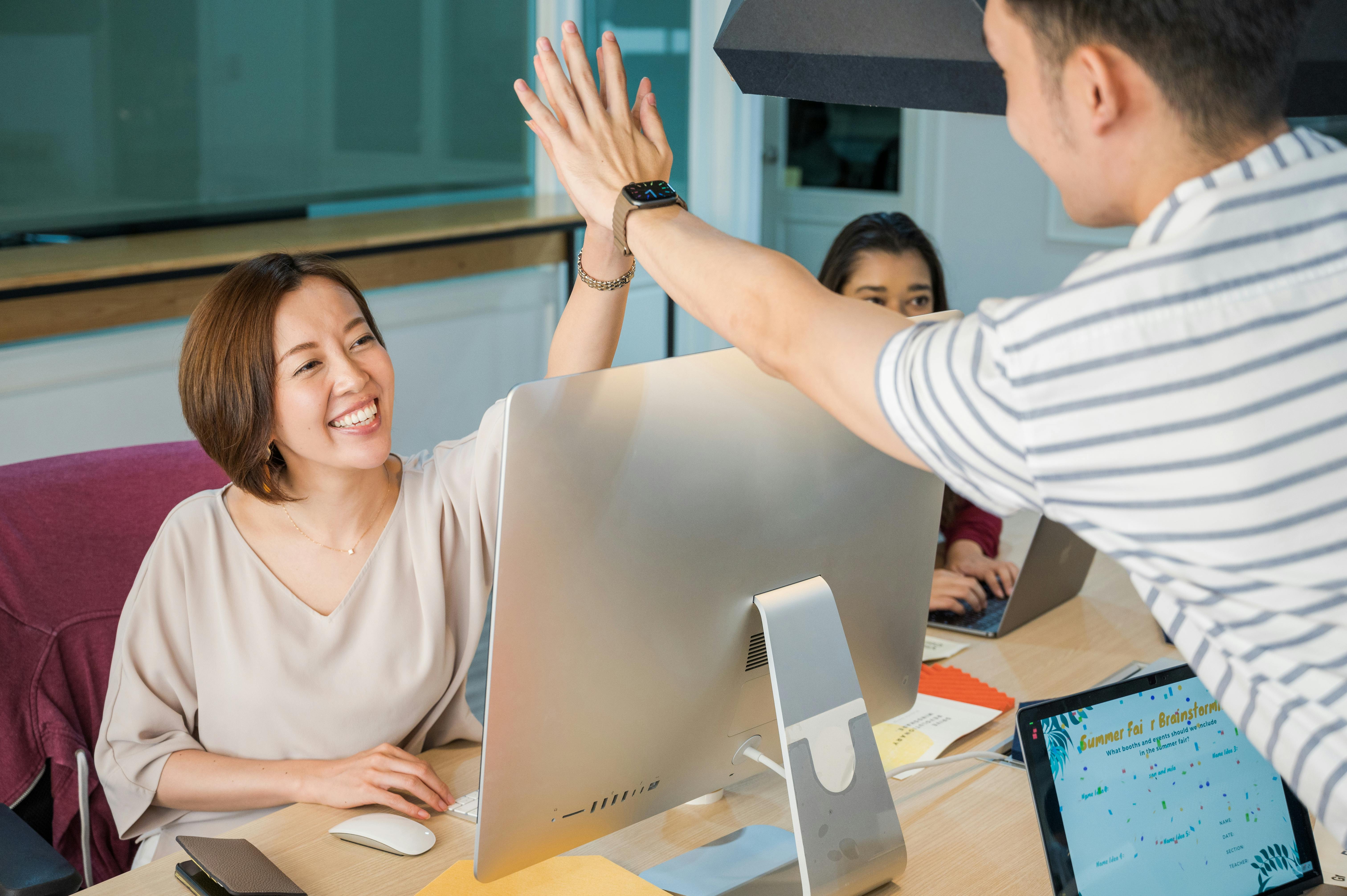 Woman Giving High Five to the Man · Free Stock Photo