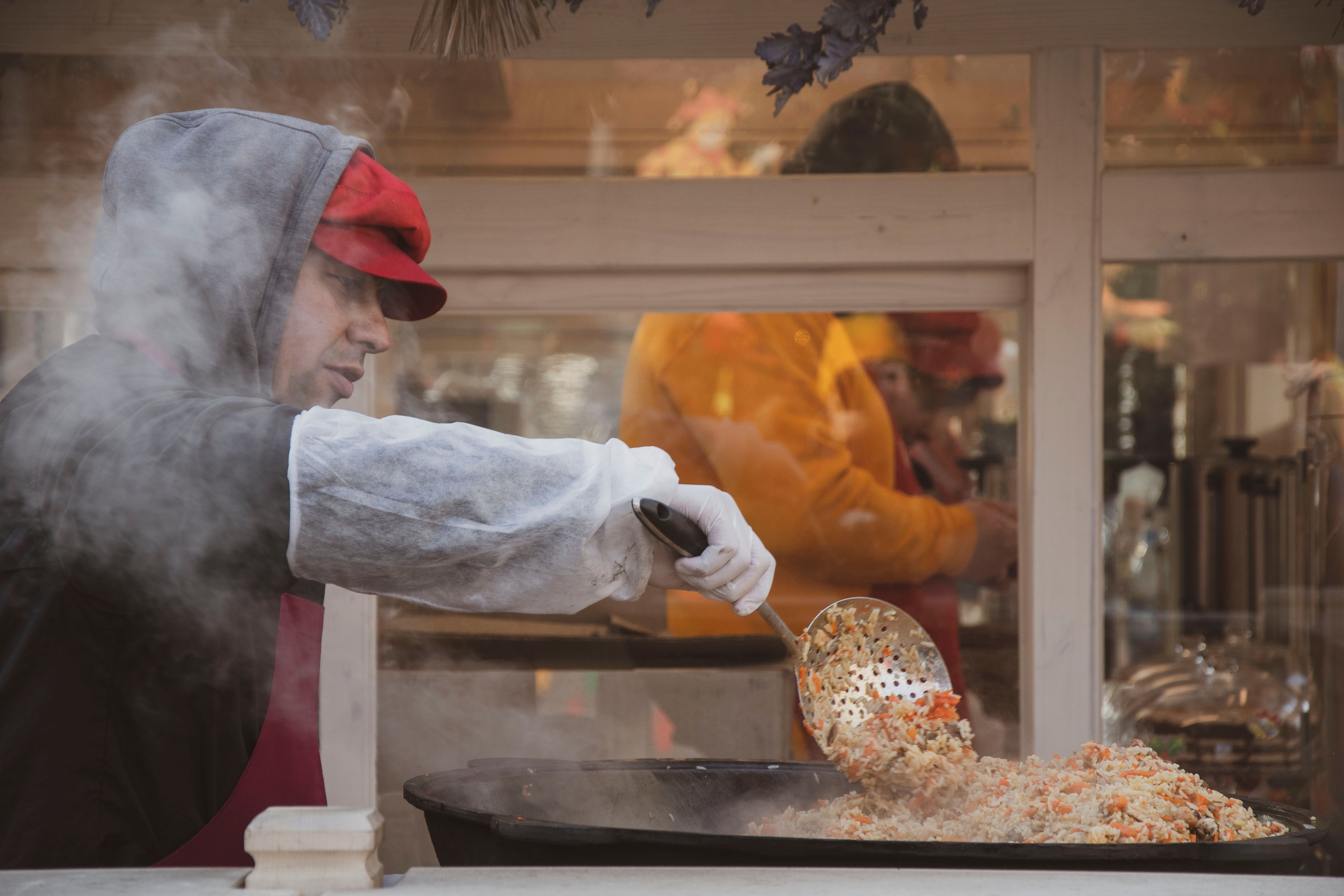 Person Filling Crepe with Custard · Free Stock Photo