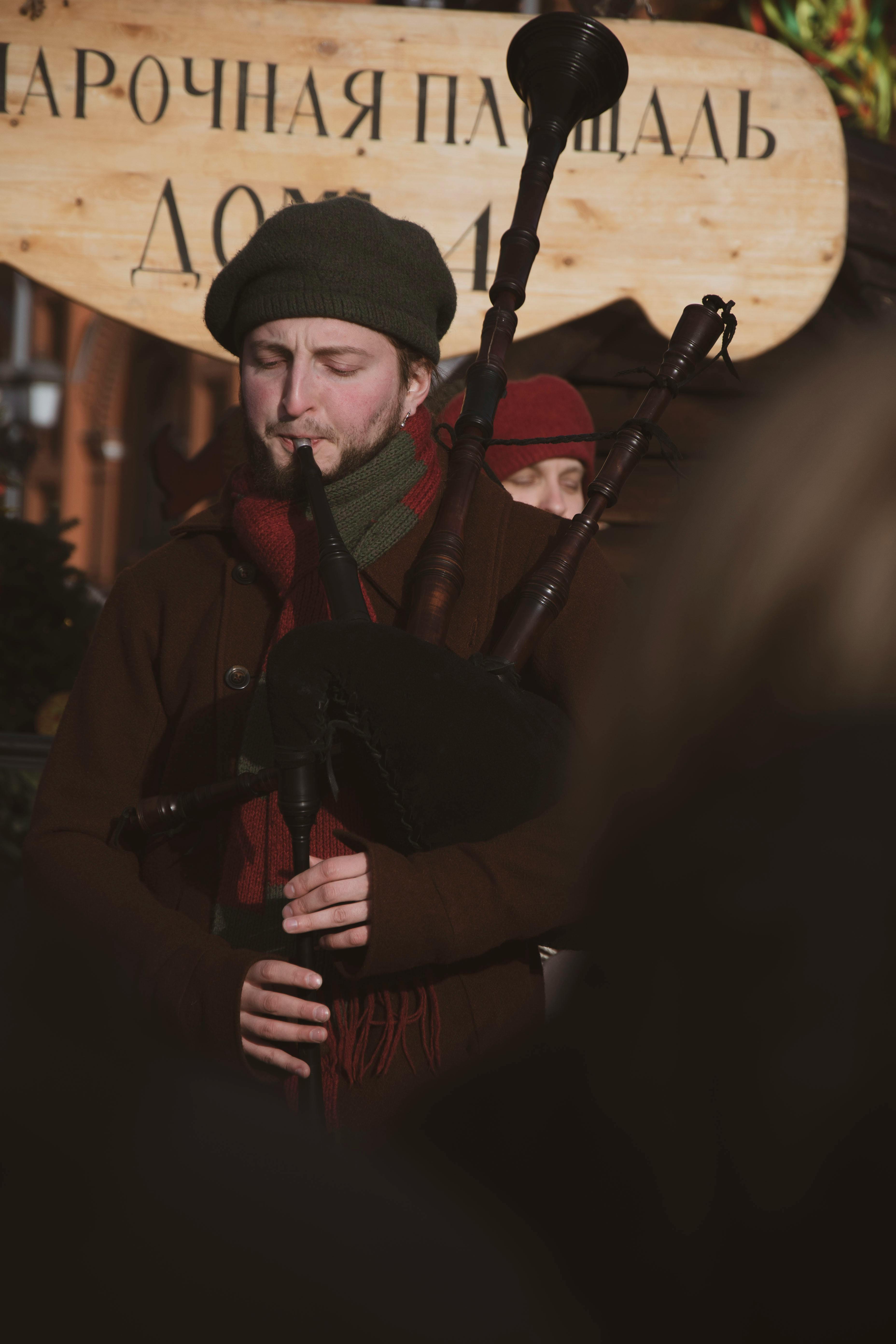 Bagpiper in Traditional Attire · Free Stock Photo
