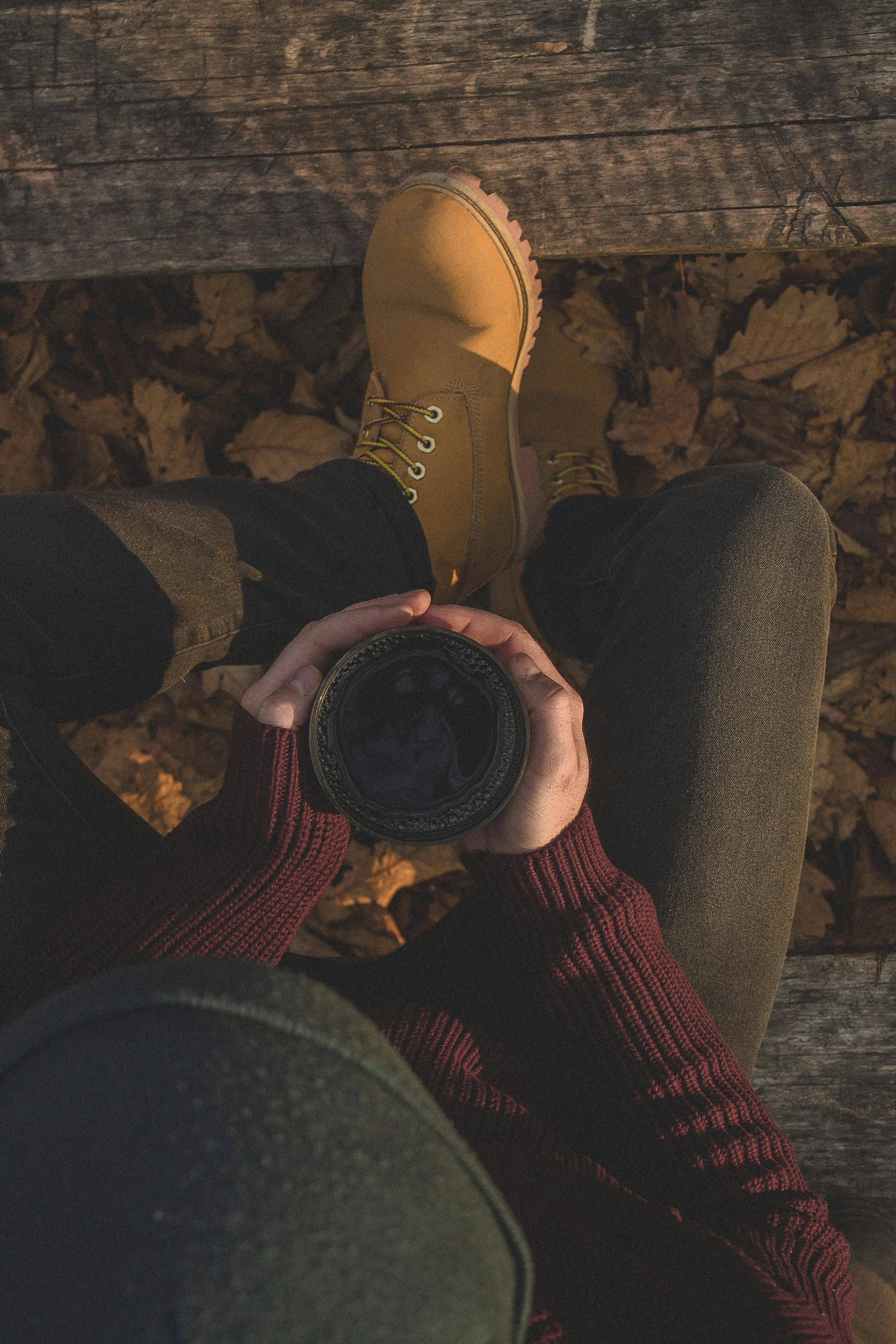 Person Stirring Liquid in a Clear Cup · Free Stock Photo