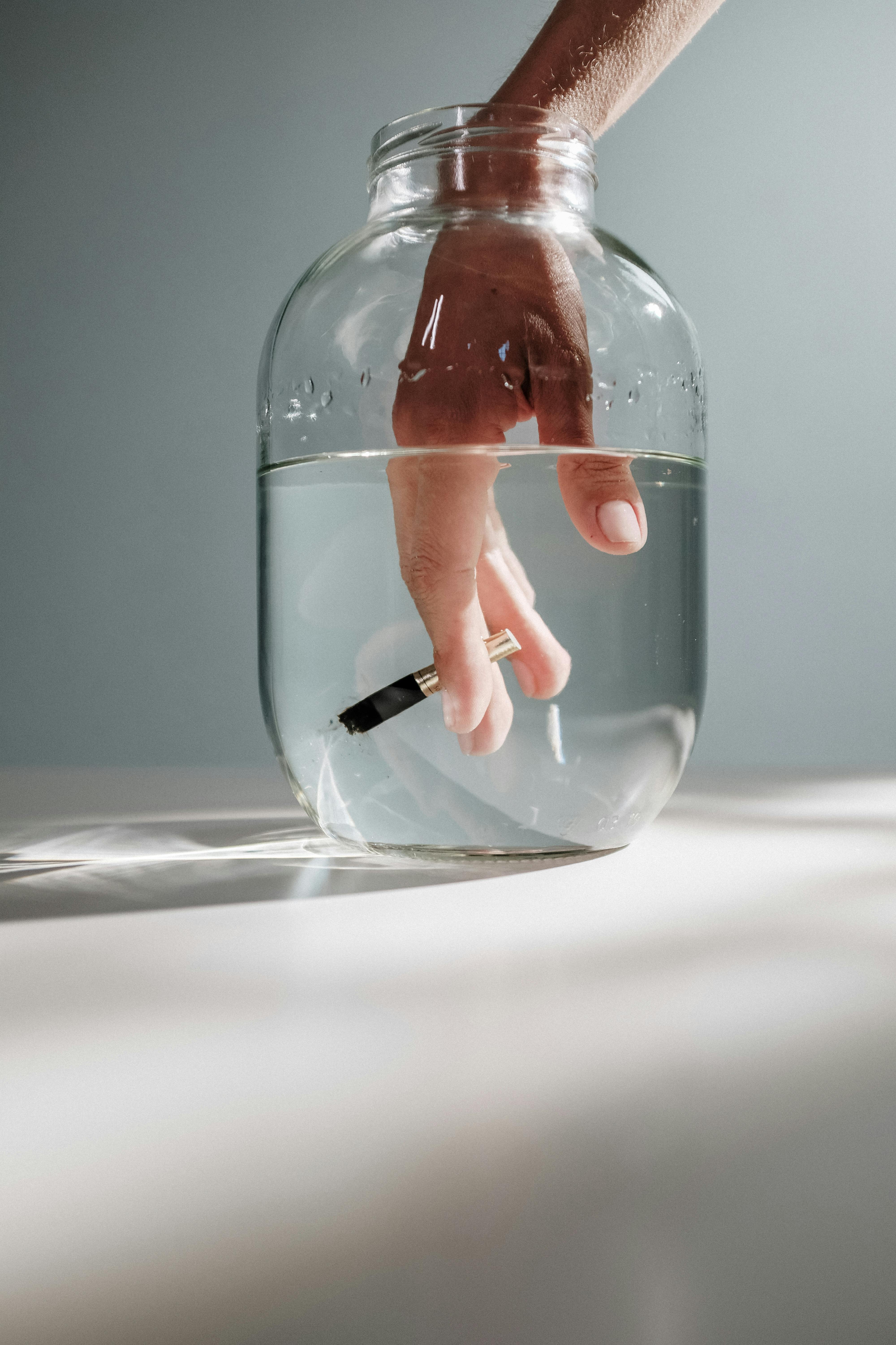 Photo of Person's Hand Submerged in Water · Free Stock Photo