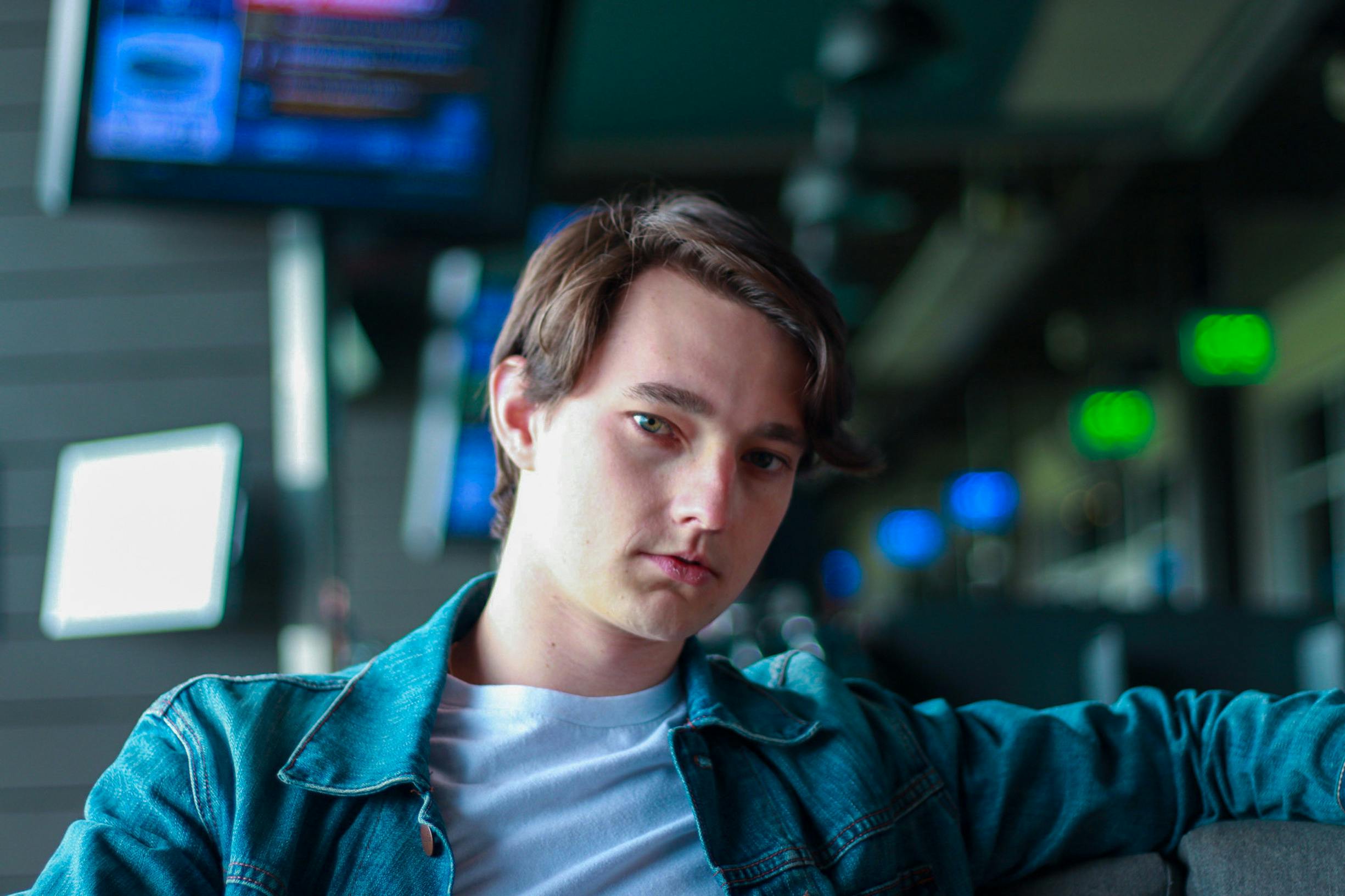 Pensive young man relaxing in cozy cafe · Free Stock Photo