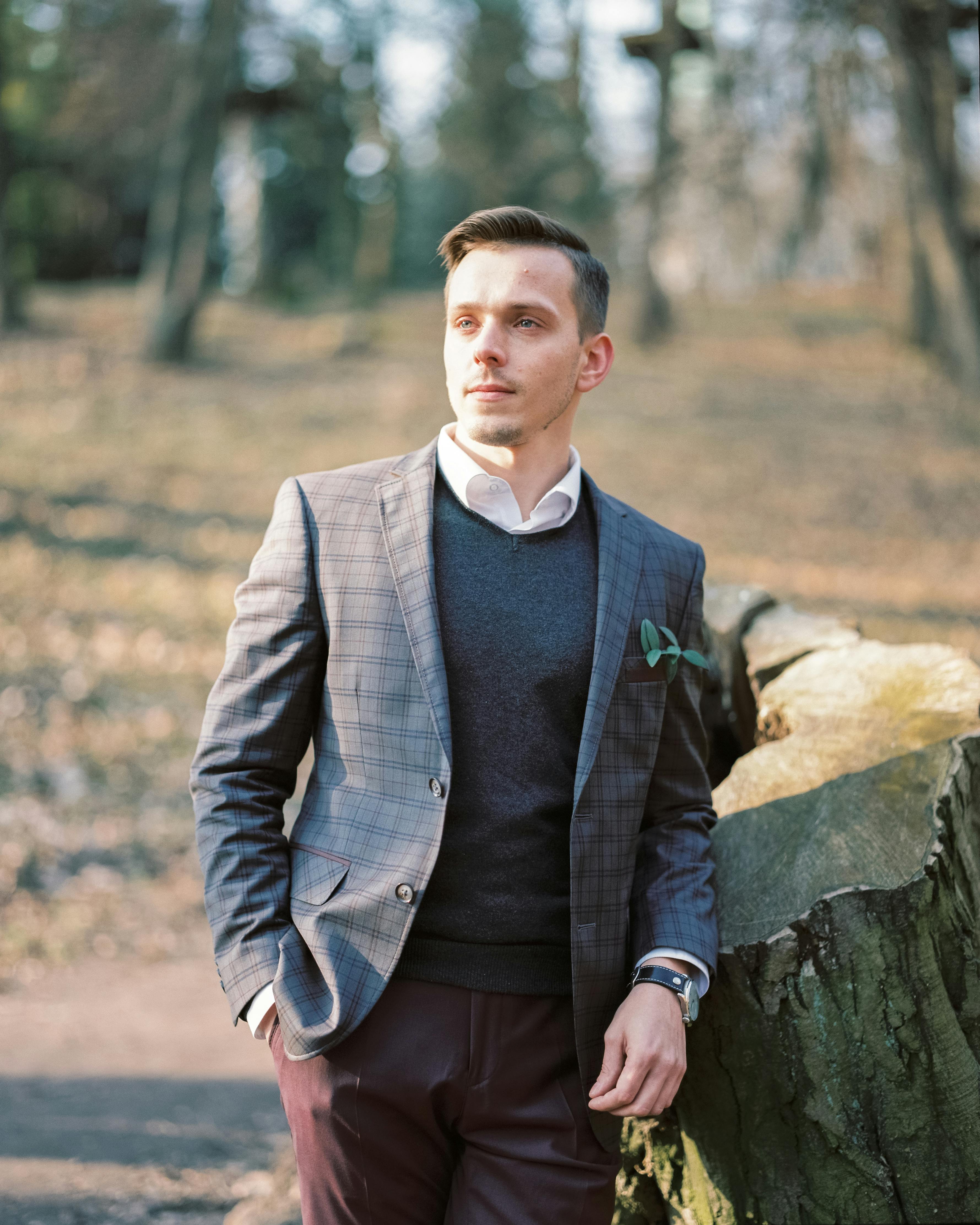 Photo of Man Standing Near Tree Stump · Free Stock Photo