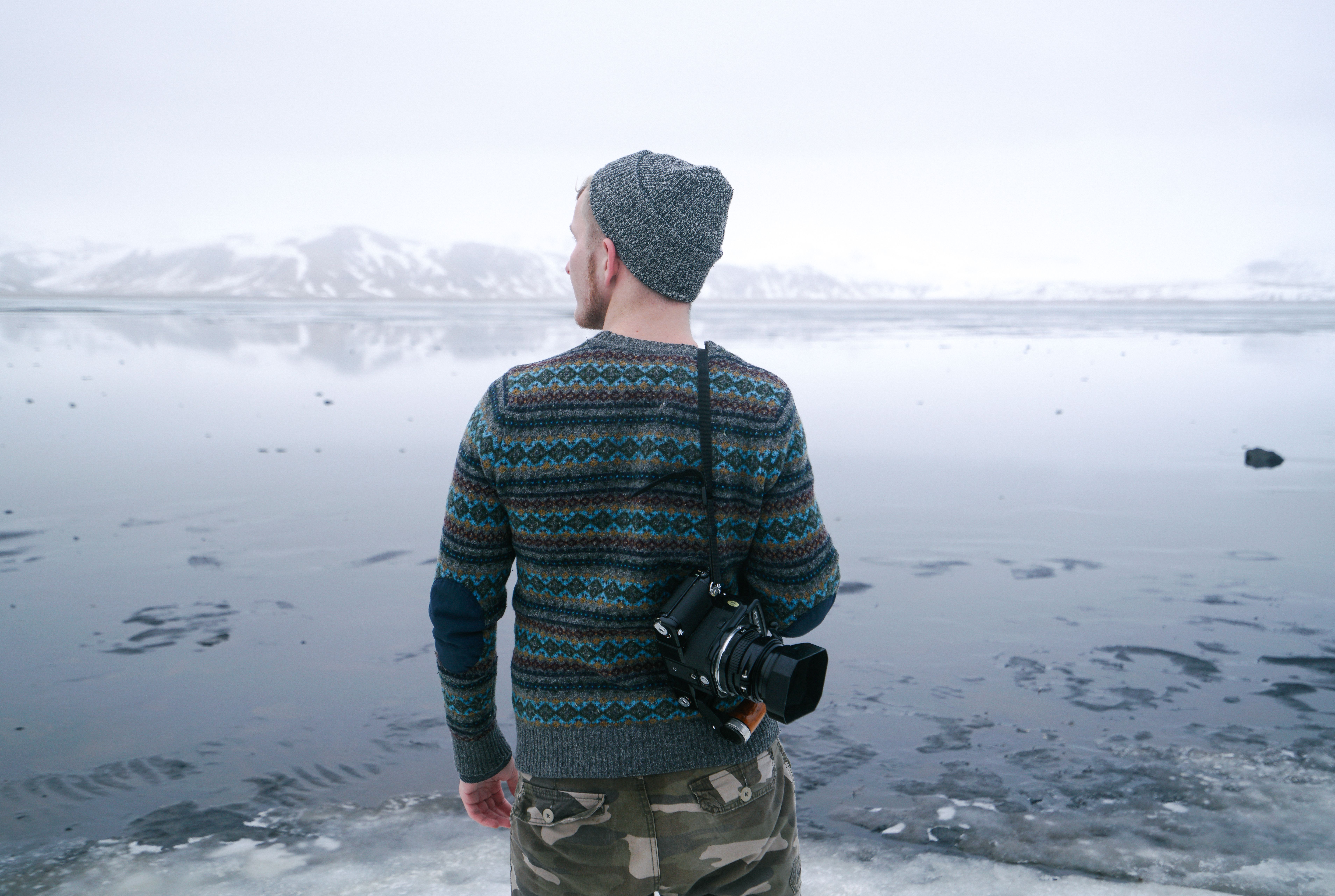 Man Looking at River in Polar Scenery · Free Stock Photo