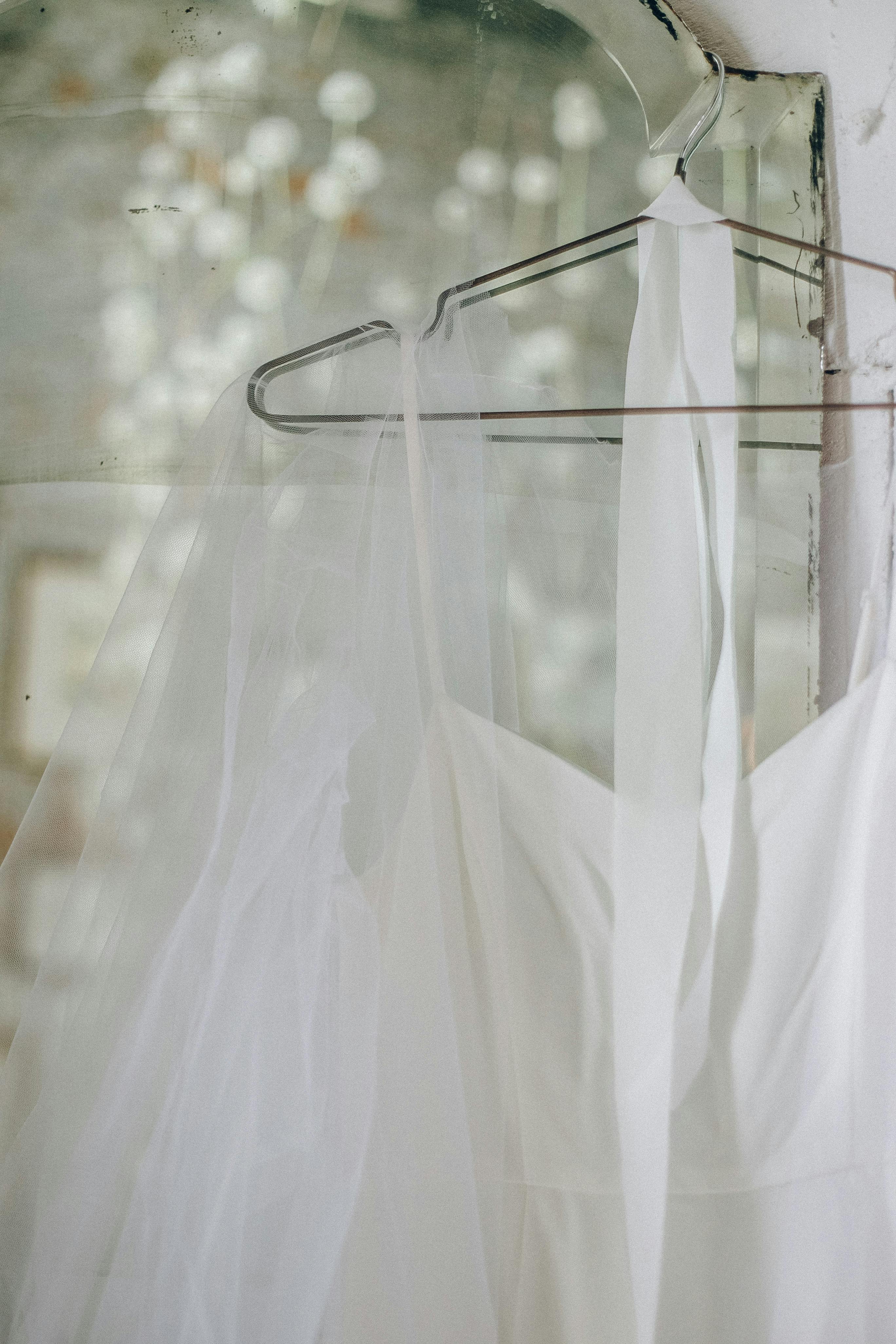 Hanged Clothes on a Clothes Rack · Free Stock Photo