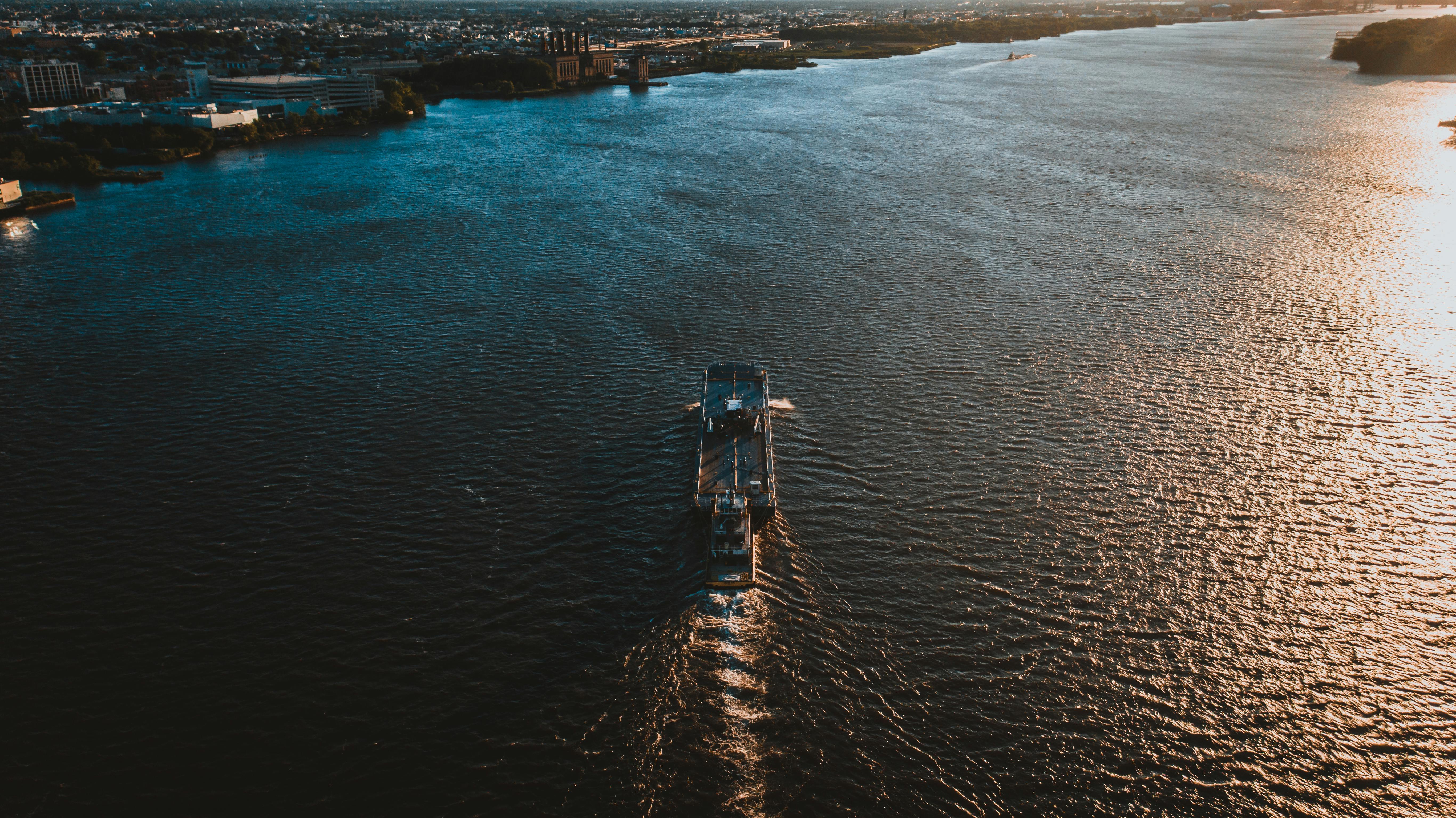 Boat making wake while floating in sea · Free Stock Photo