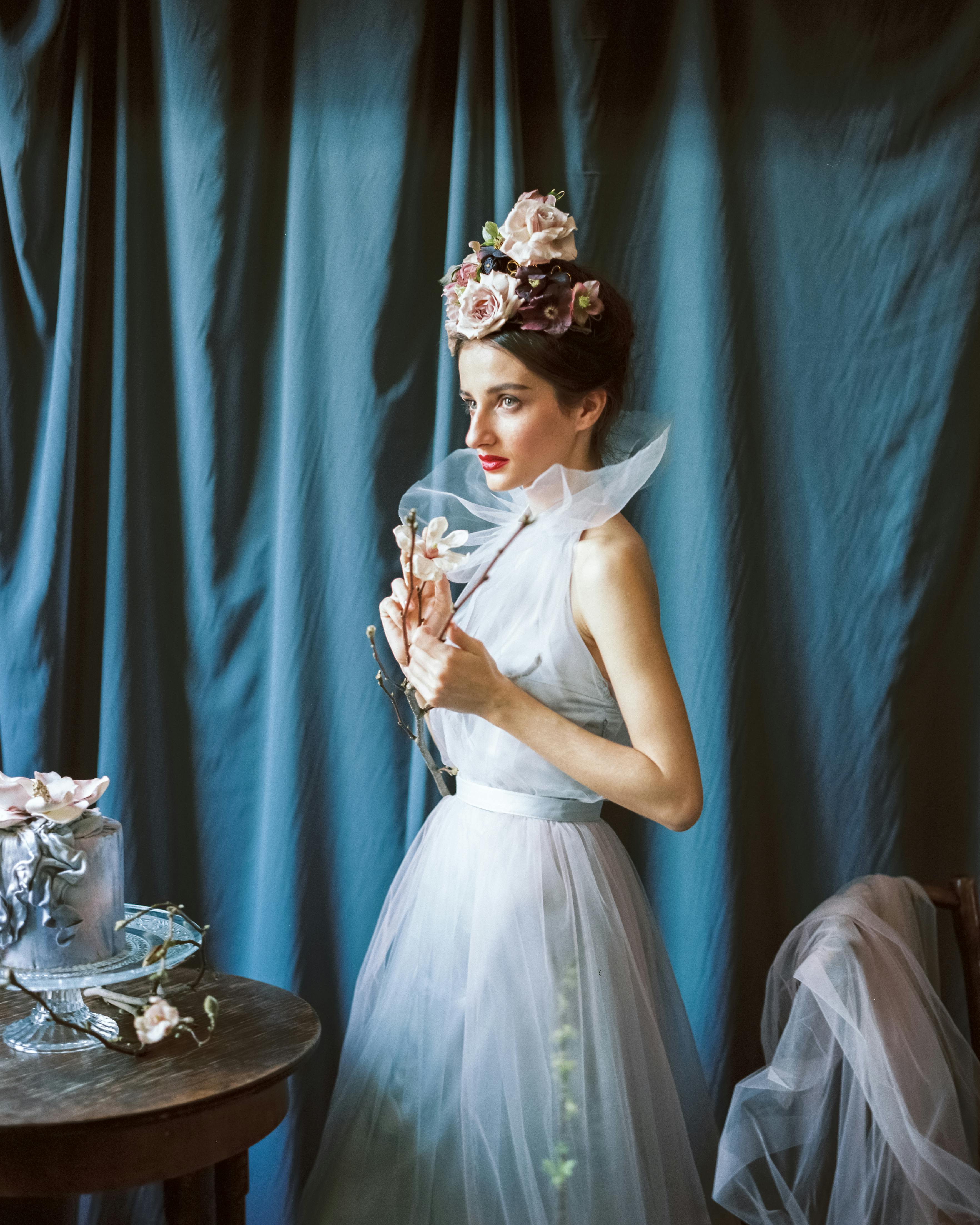 Woman in White Dress Posing on Studio Background · Free Stock Photo
