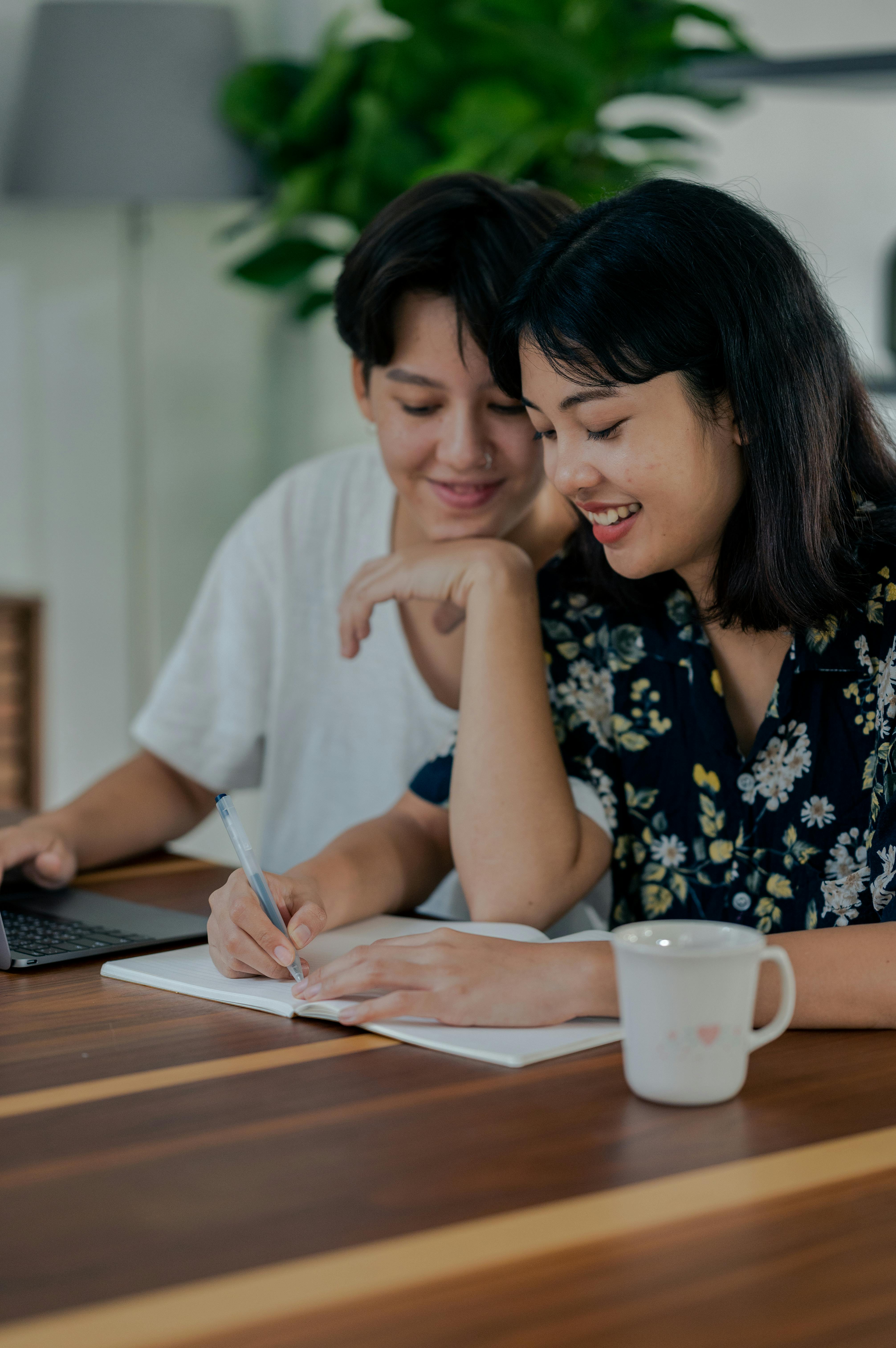 Women Writing Together · Free Stock Photo