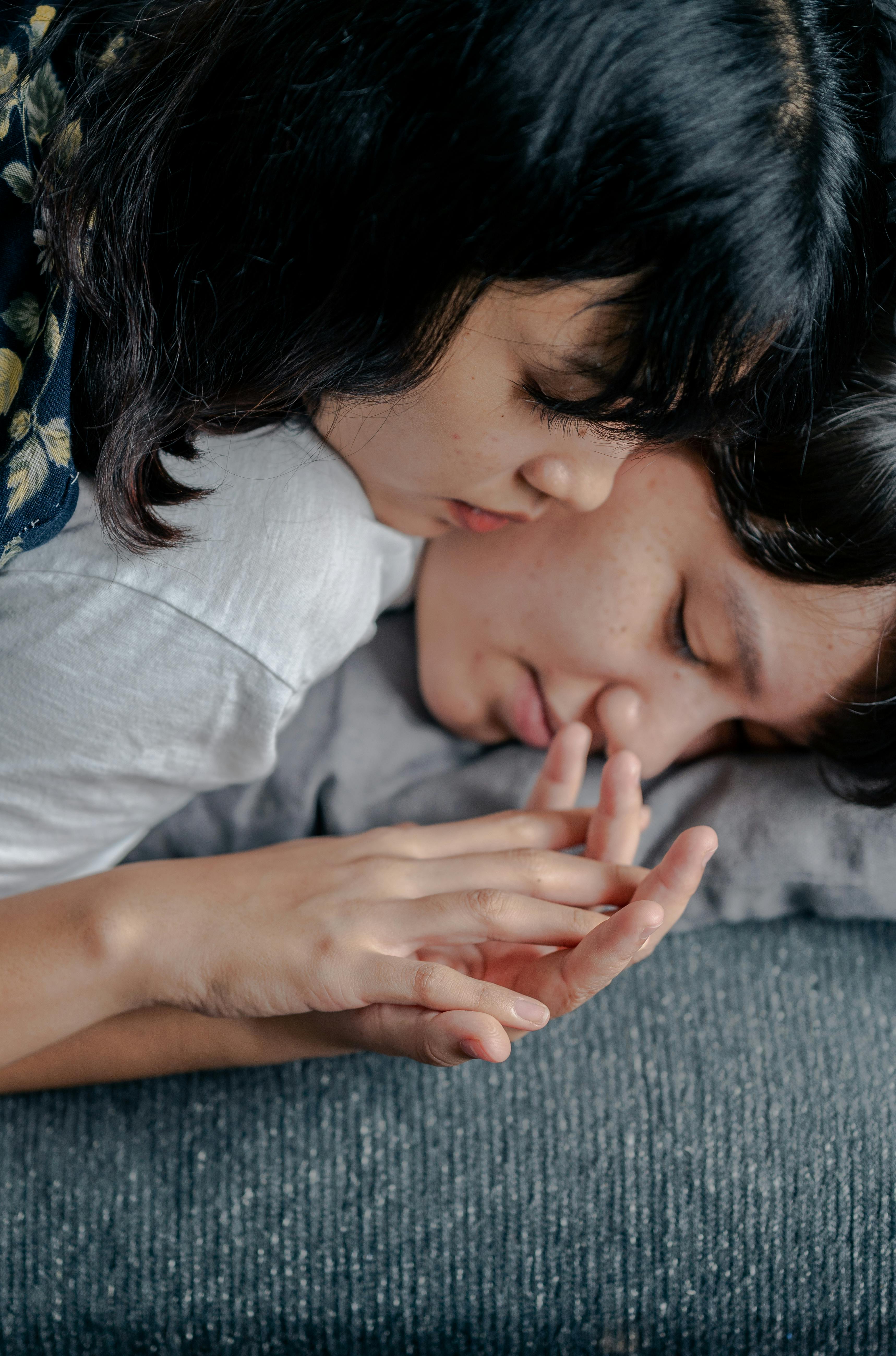 Couple Cuddle Together in Bedroom · Free Stock Photo