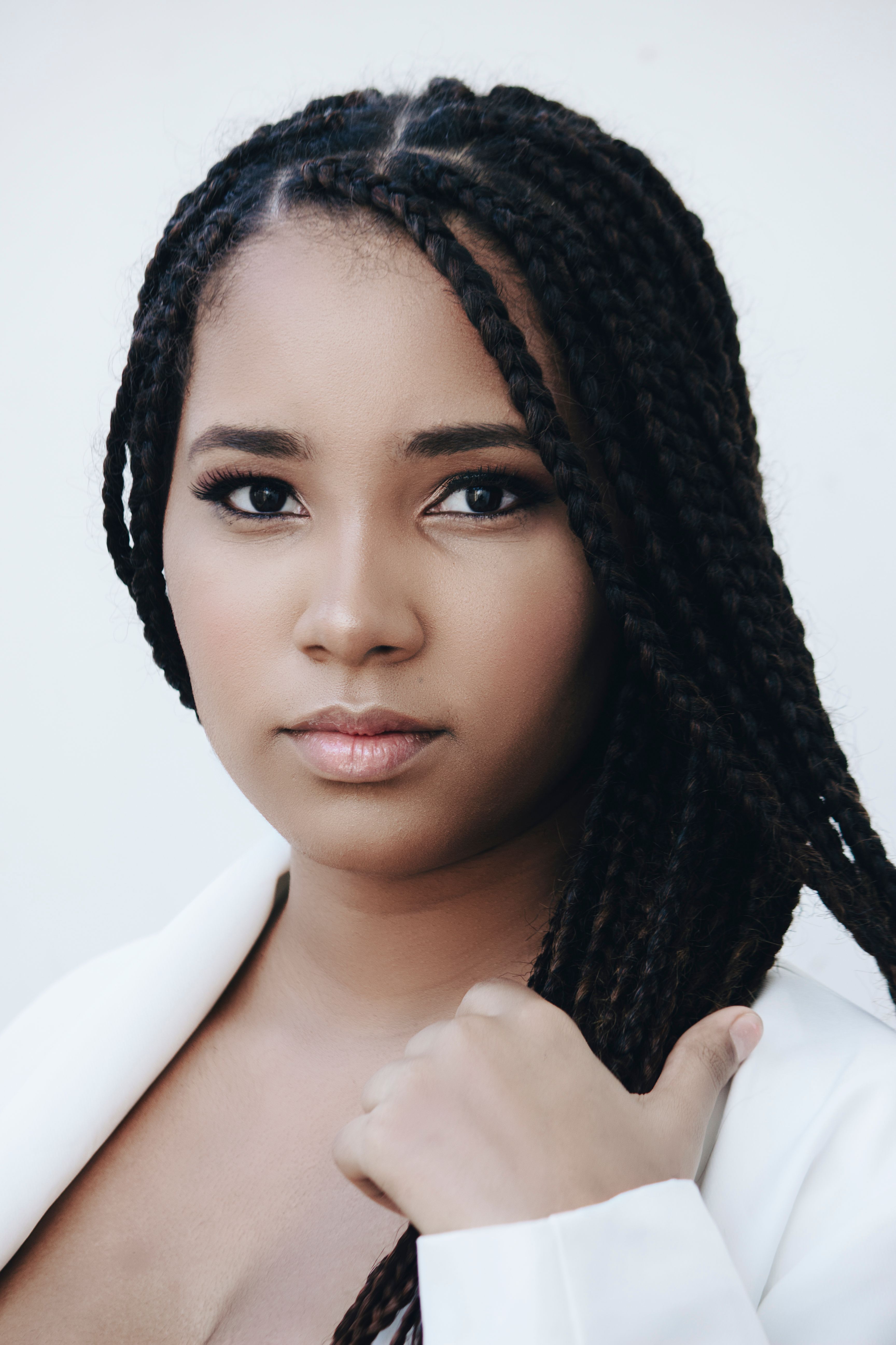 Woman In White Top With Black Braided Hair Free Stock Photo