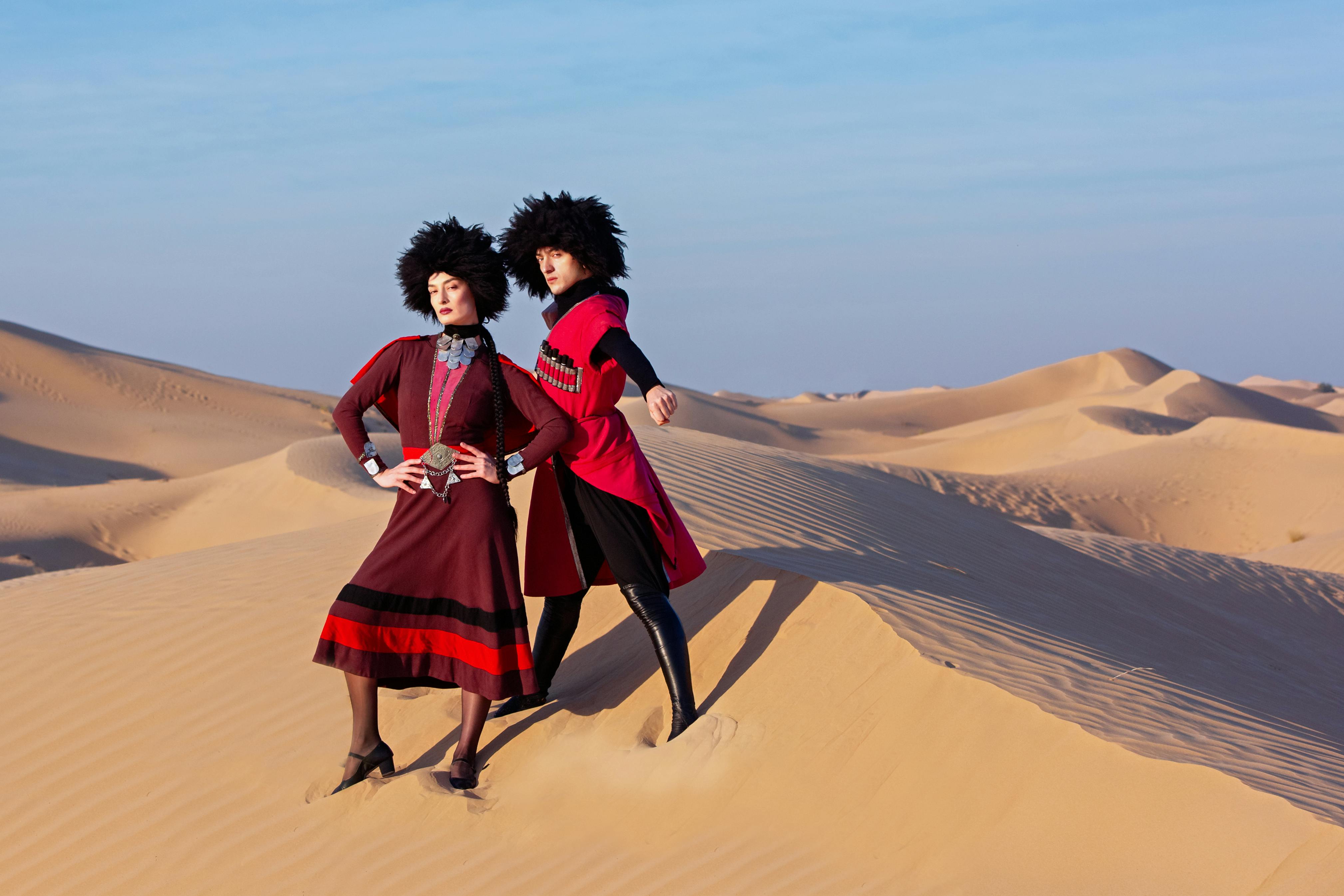 Photo of Two Person Standing on Desert · Free Stock Photo