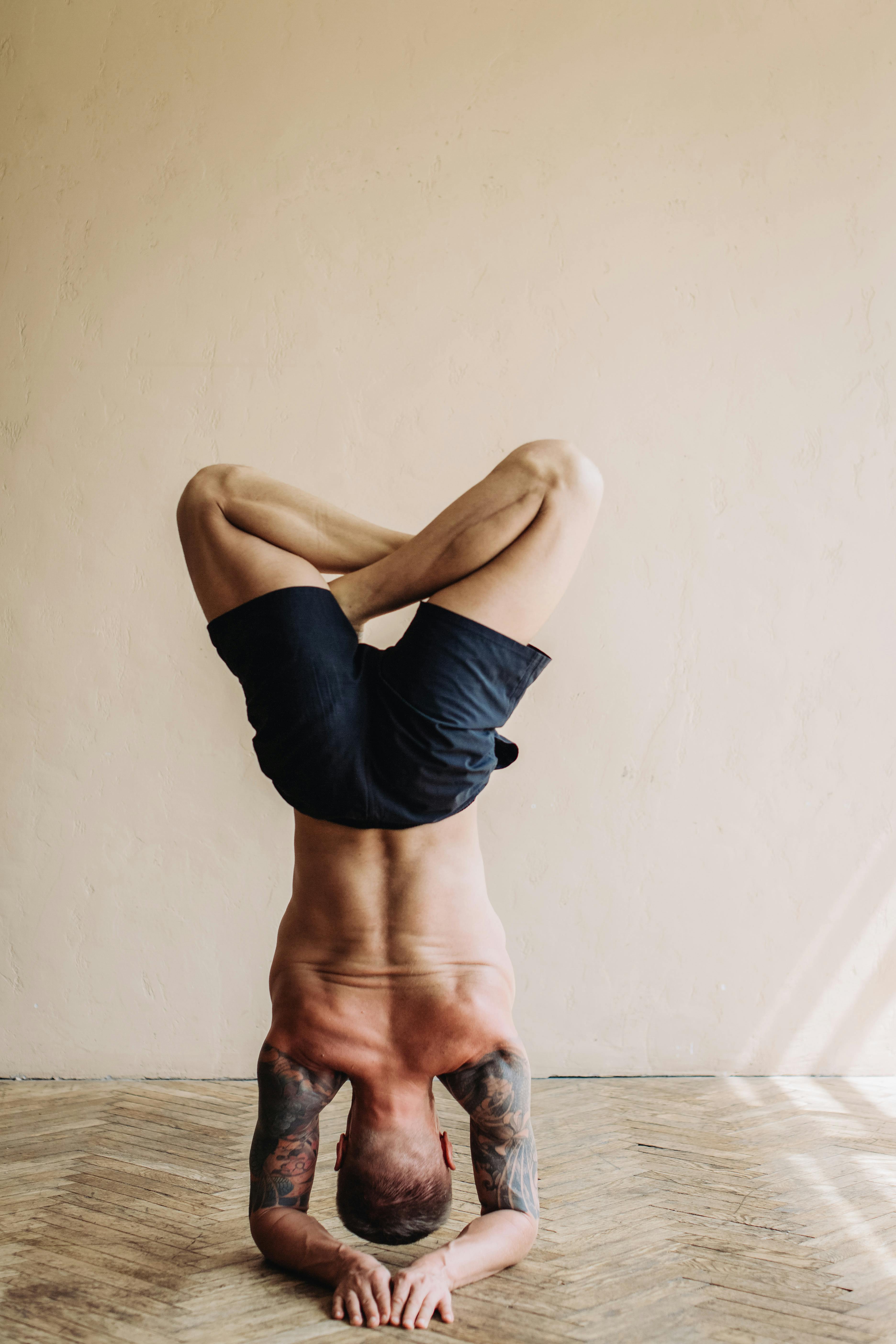 A Man Doing Hand Stand · Free Stock Photo