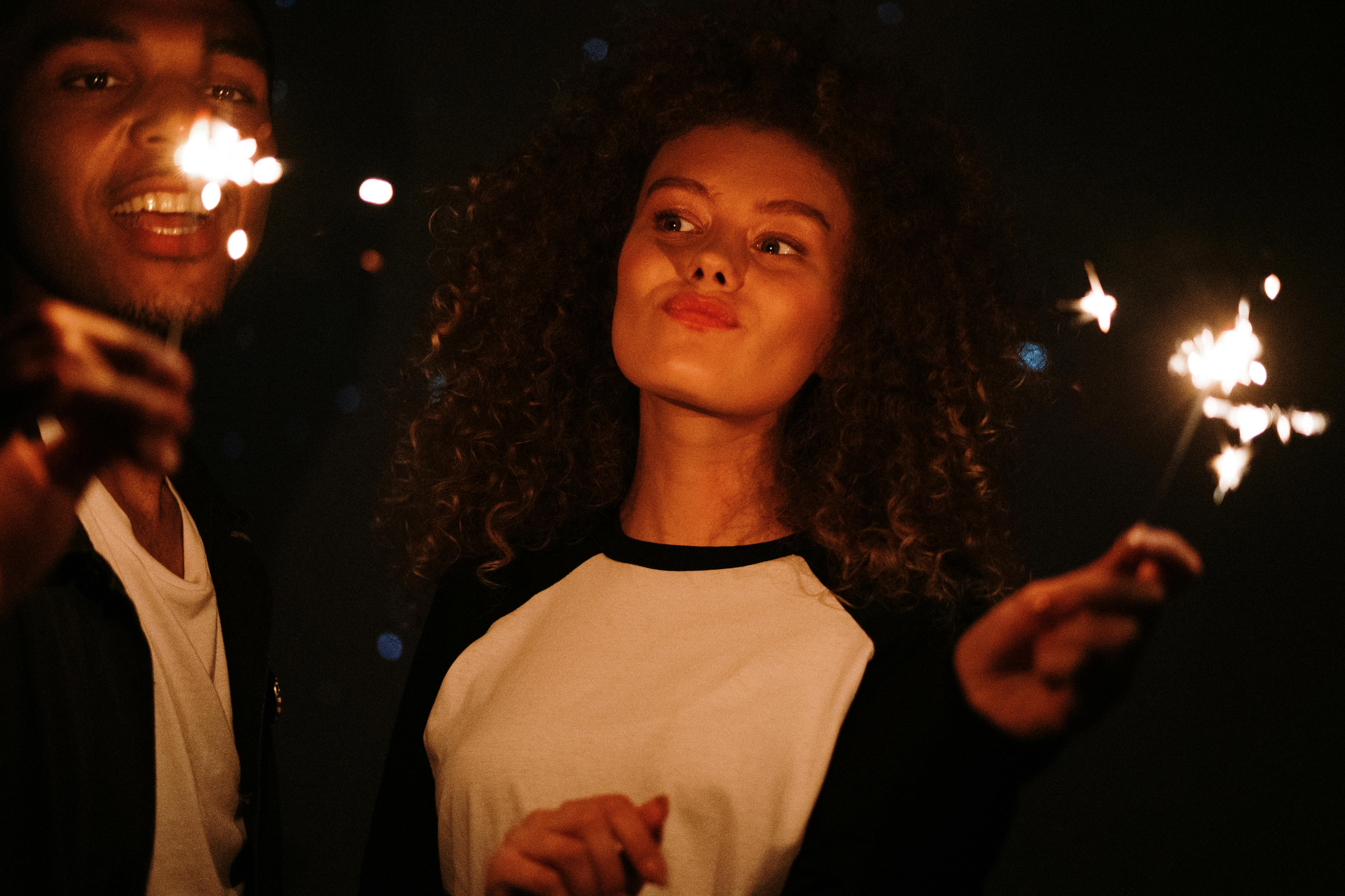 Couple Holding Sparklers · Free Stock Photo